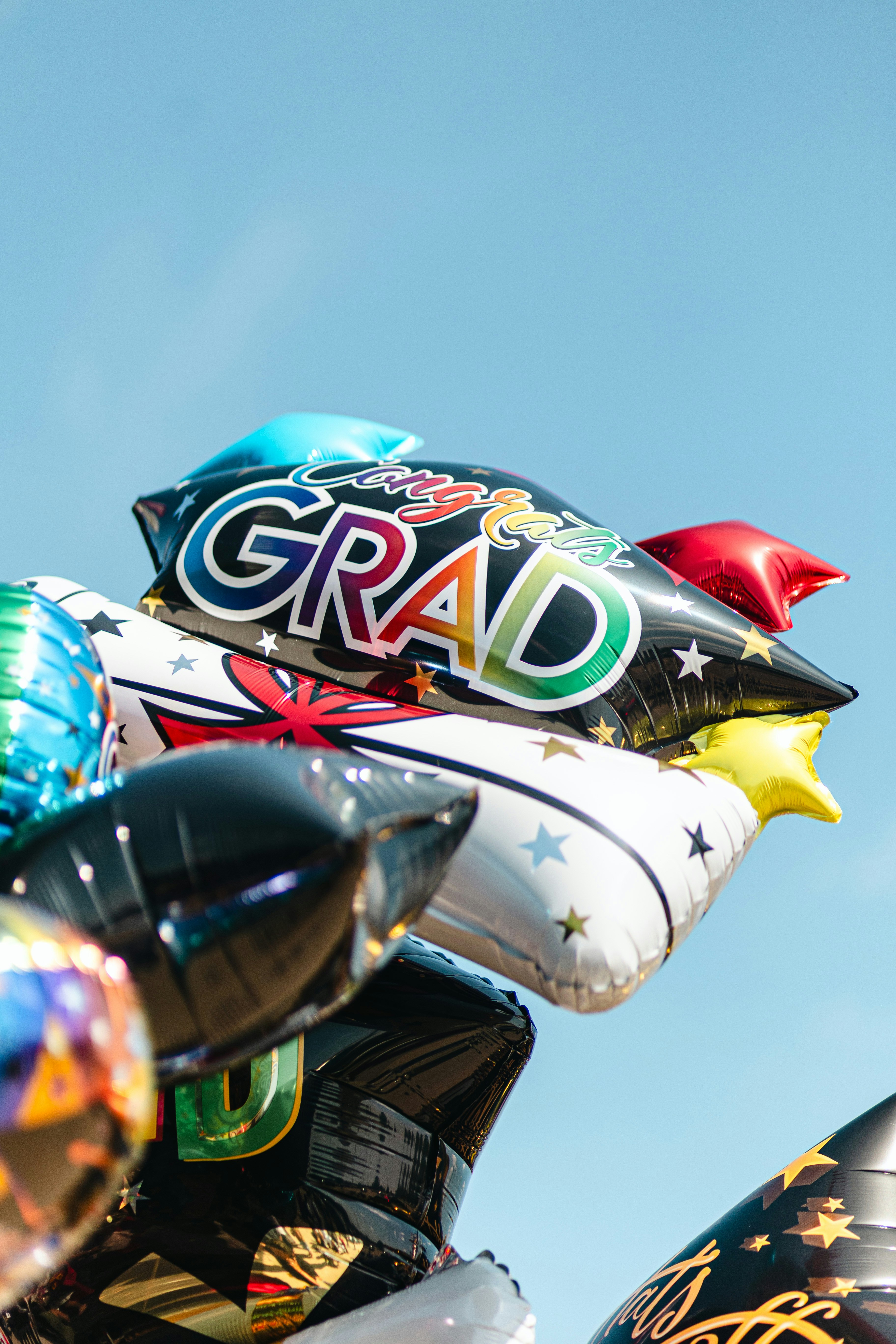 Graduation Balloon Burst: A Sky-Blue Celebration