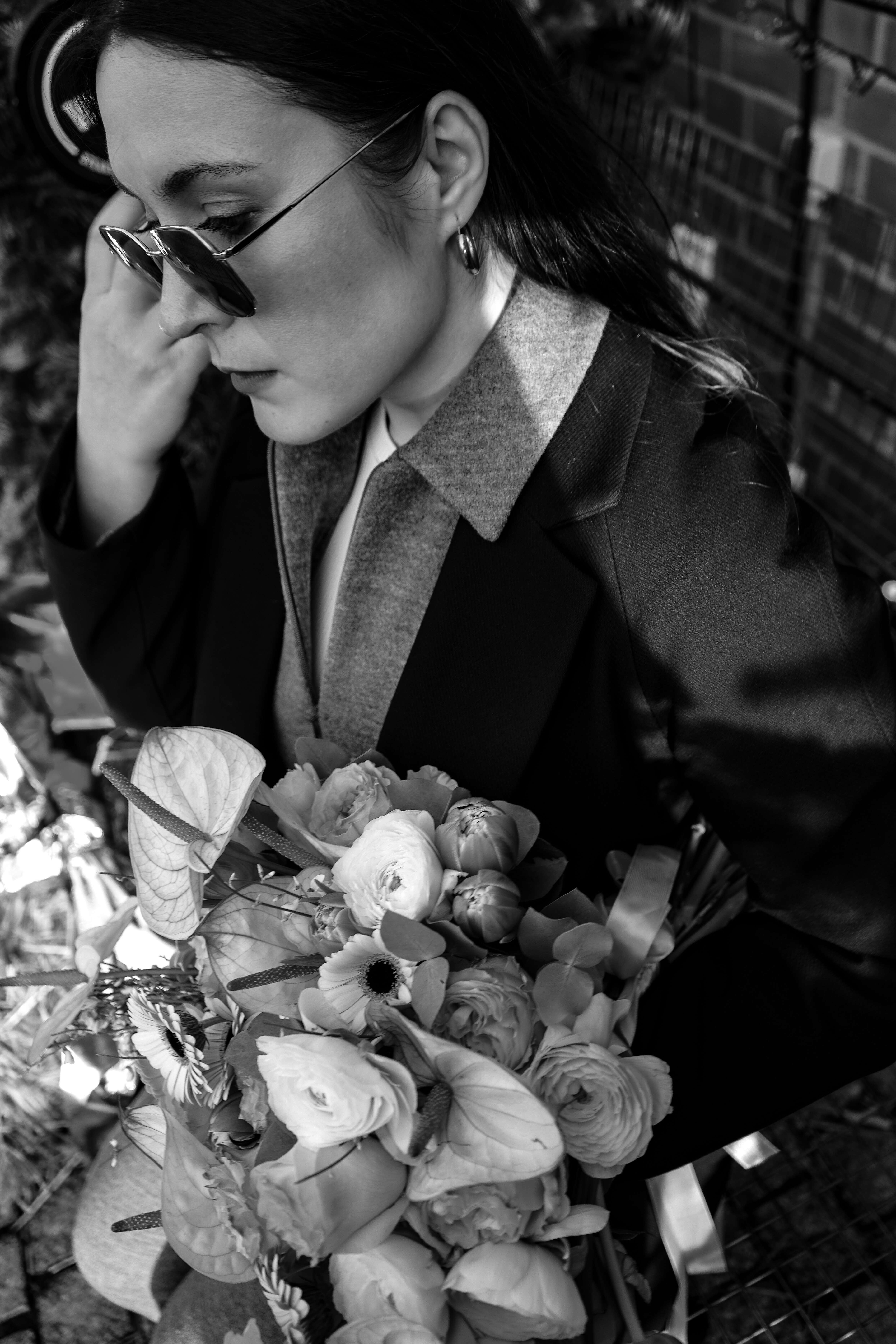 Shadowed Bloom: A Portrait in Mono with a Bouquet of Quiet Echoes