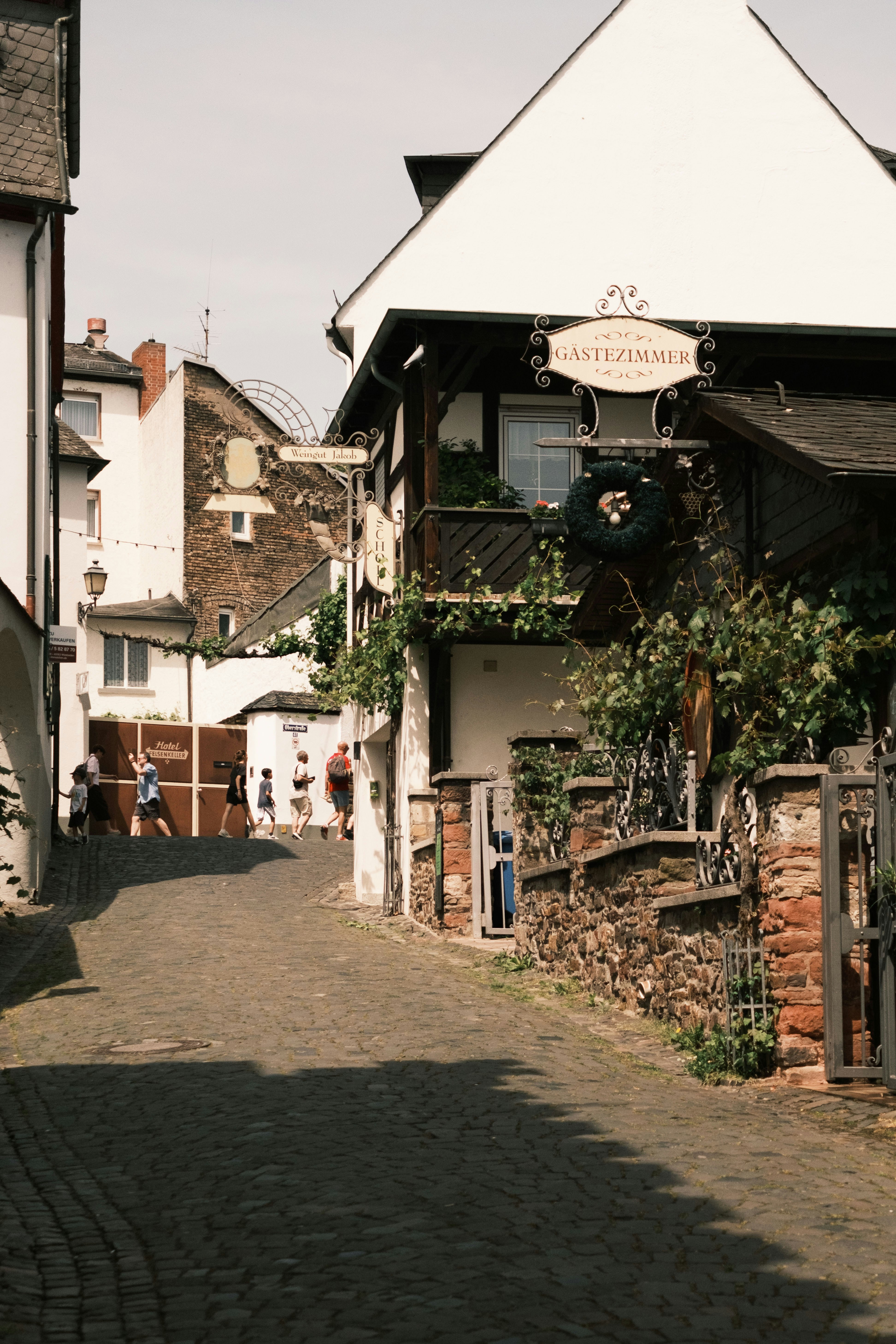 Cobbled Street to a Quiet Alpine Village Shopfronts