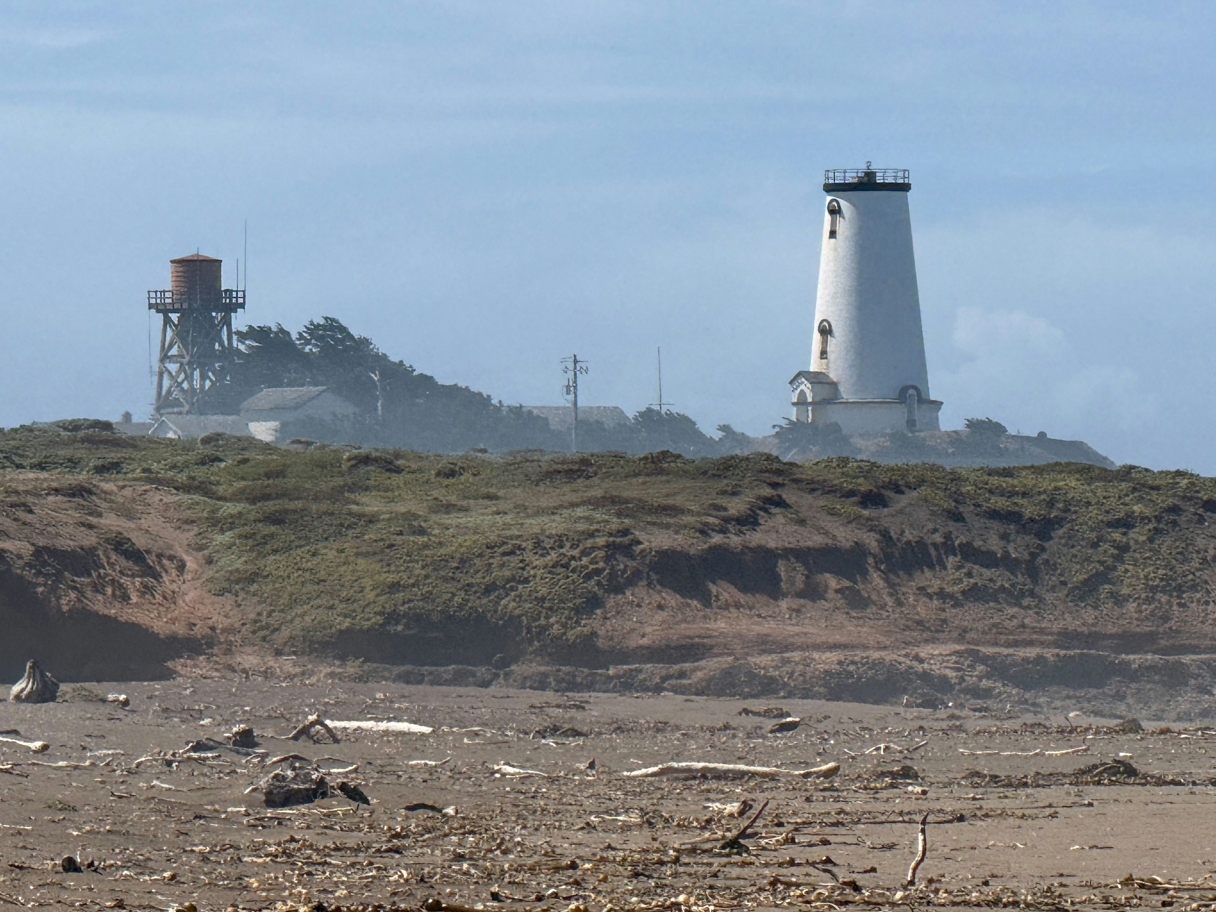 Lighthouse Sentinel over a Wind-Washed Shore