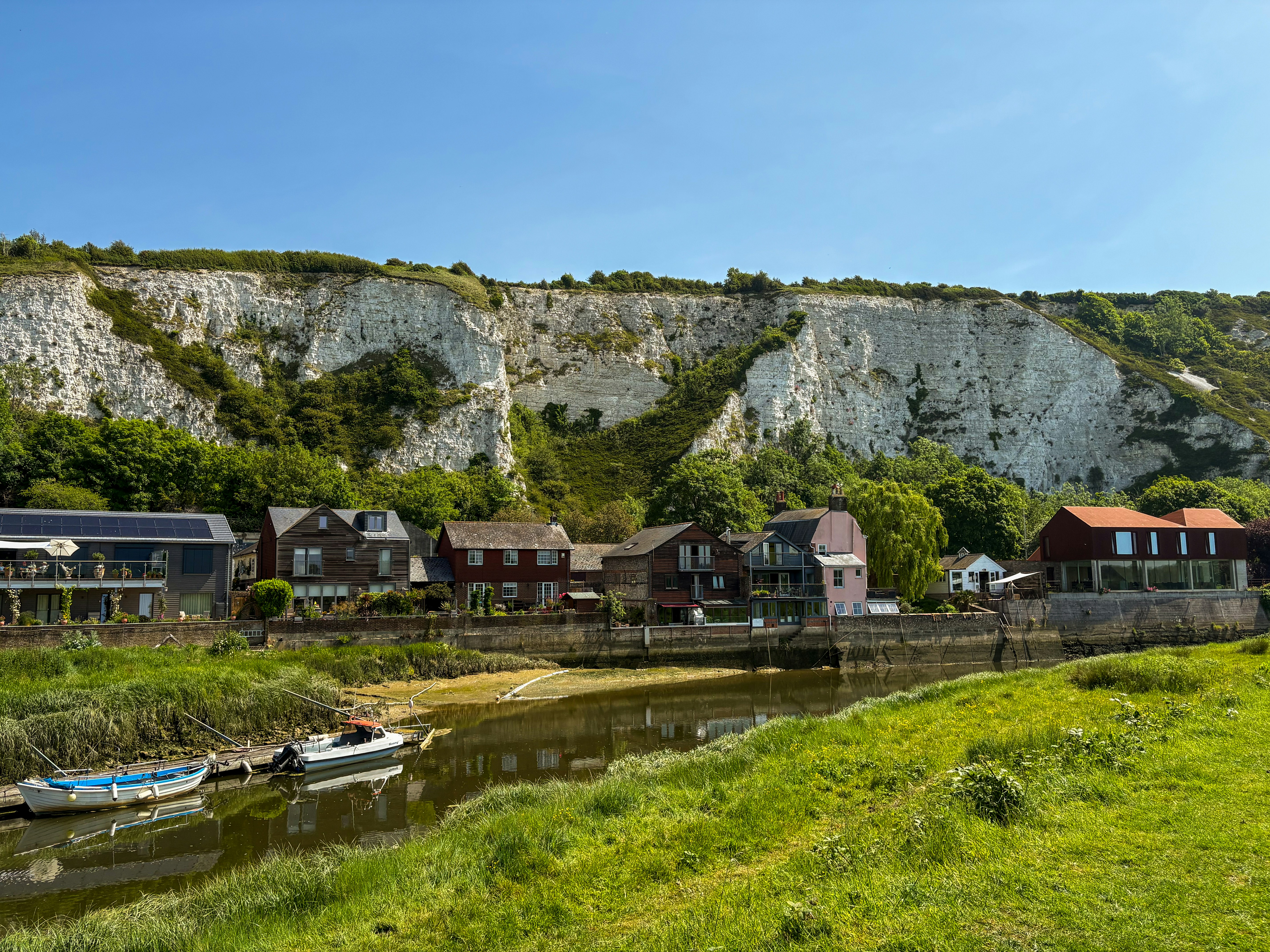 Cliffs Overlooked by a Quaint Riverside Village