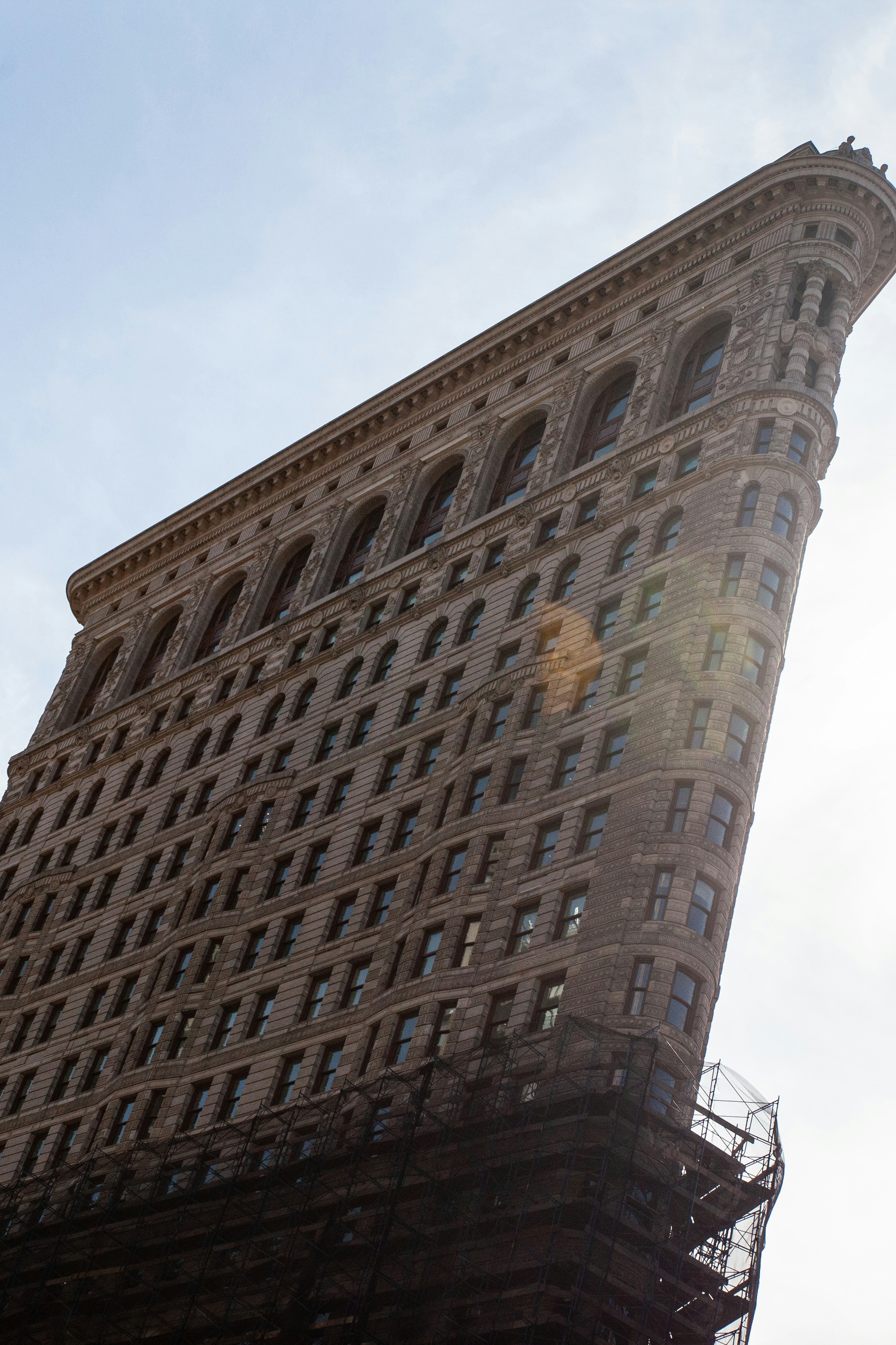 The Leaned Facade of a Gilded High Rise