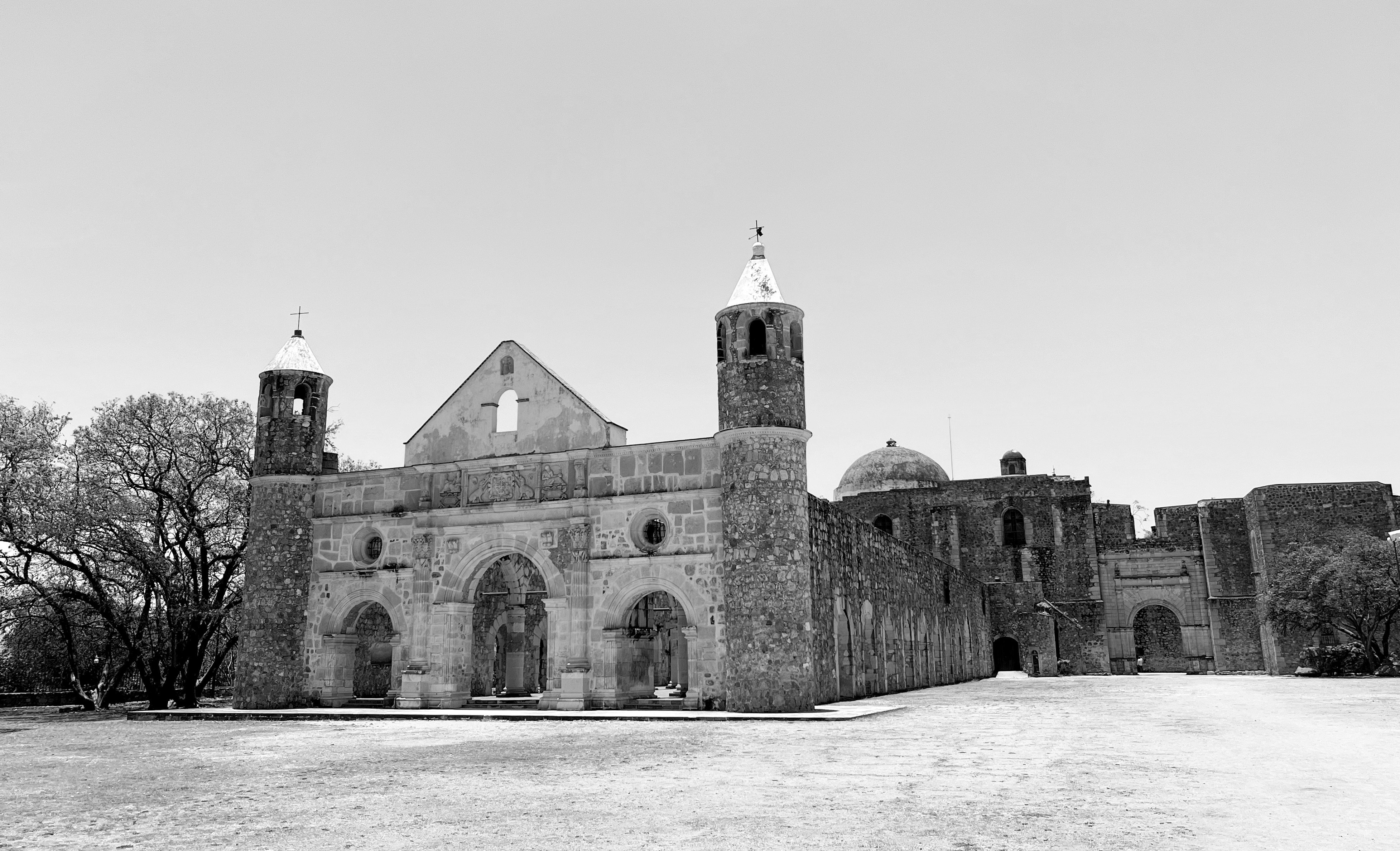 Ruins of an Old Fortress Gate Under Wide Sky