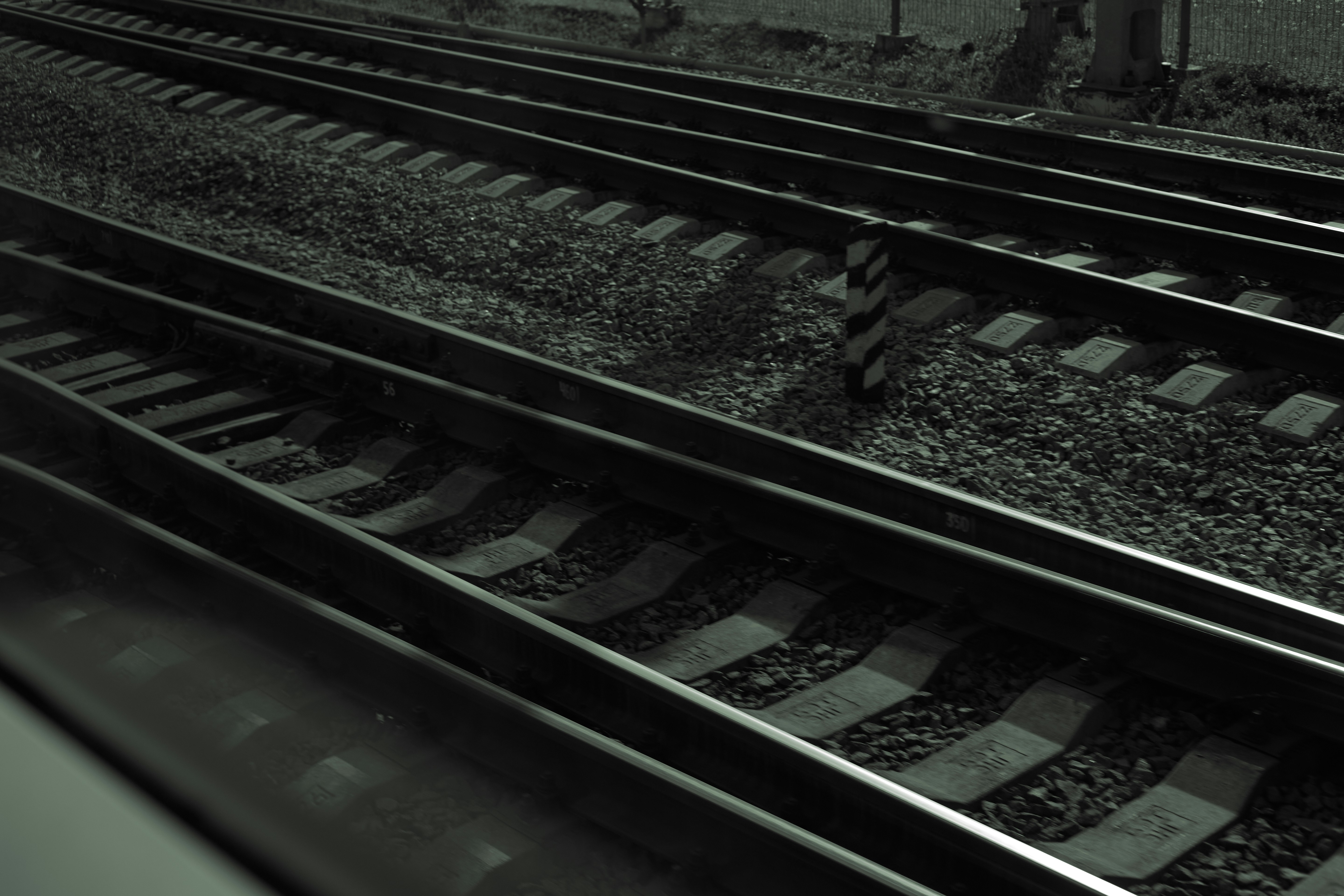 Railway Shadows: A Monochrome Crossing