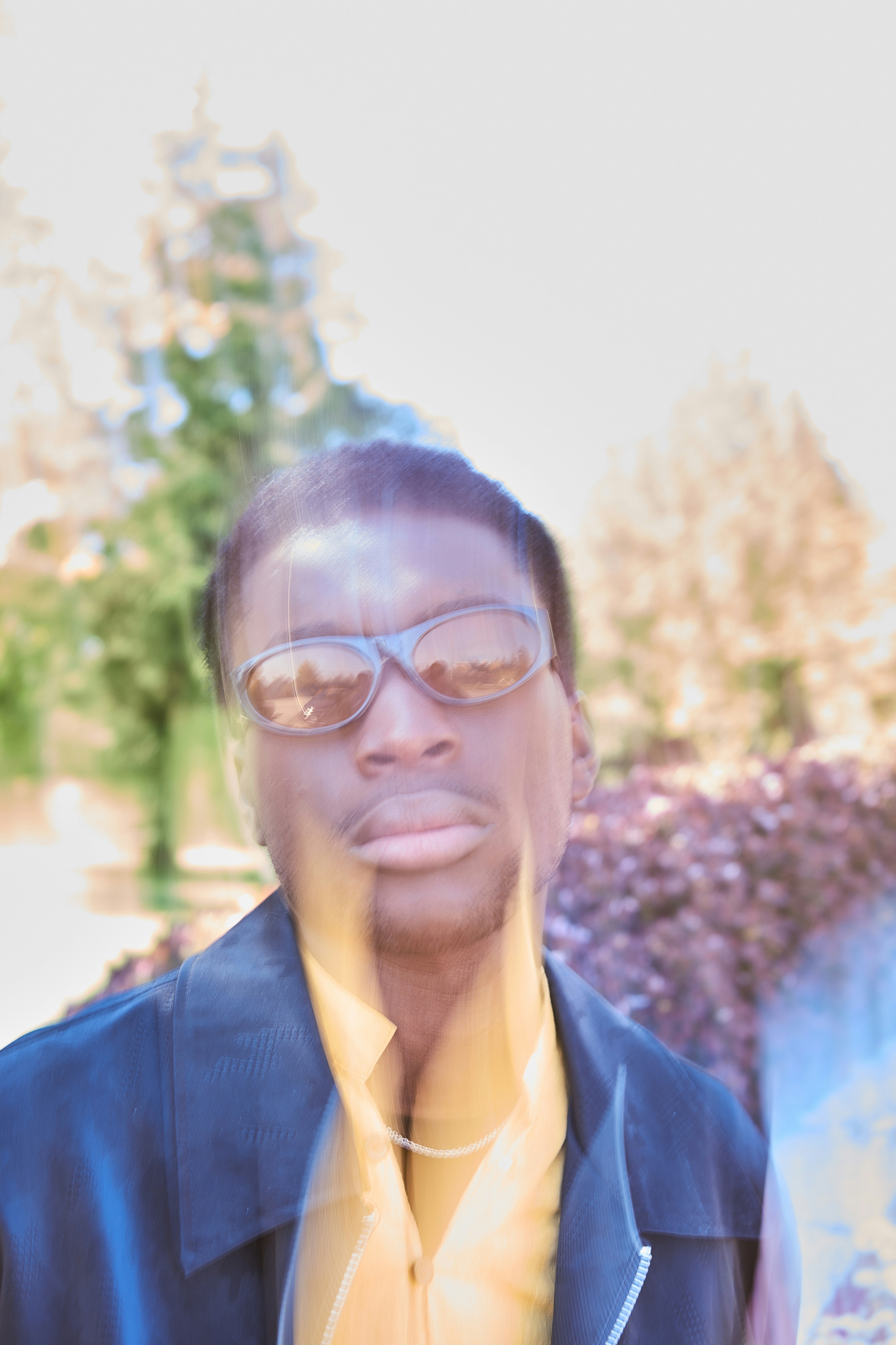 Blurred Double Exposure of a Stylish Portrait