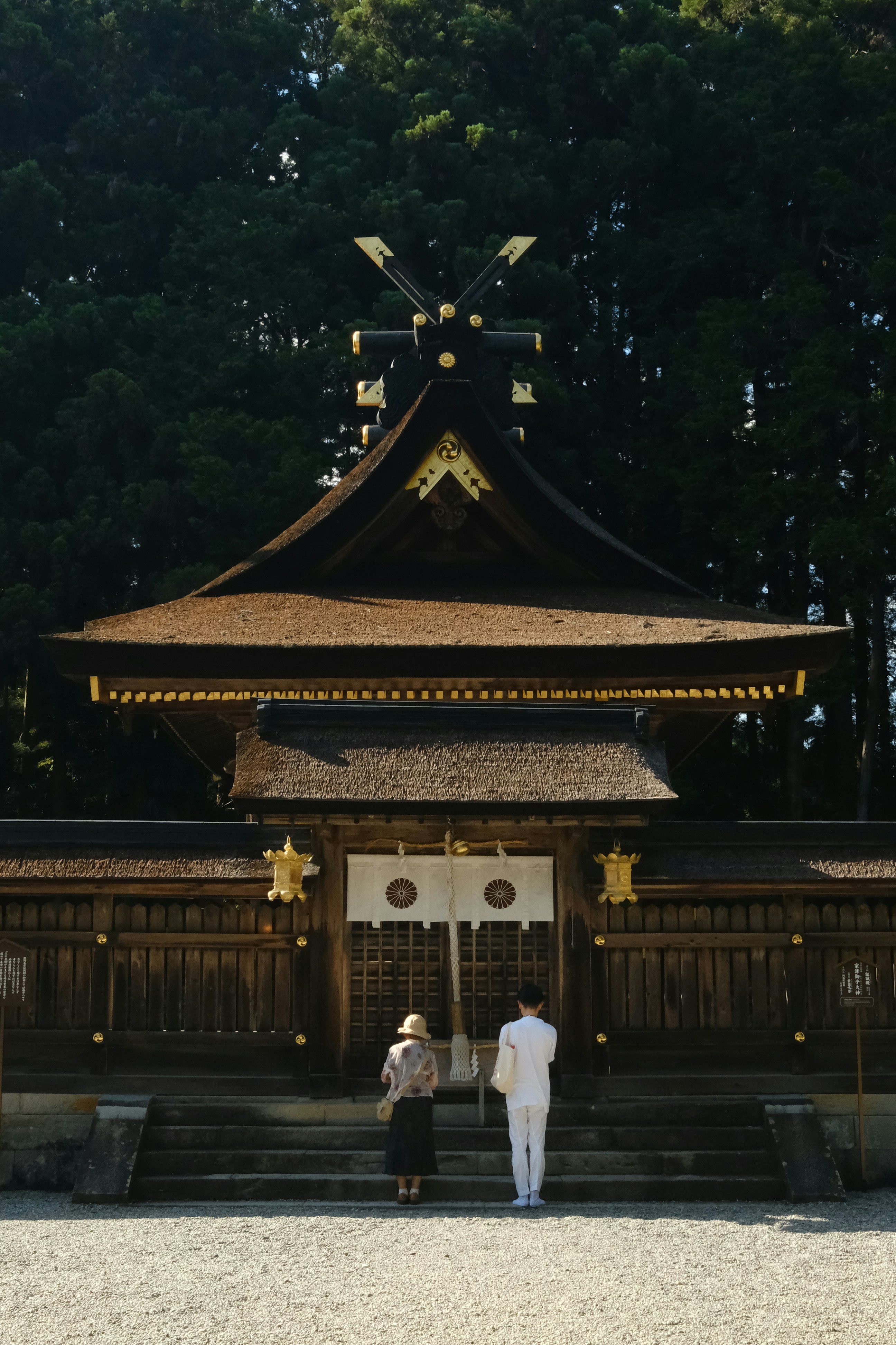 Shinto Gatekeepers: A Quiet Moment at the Temple Threshold