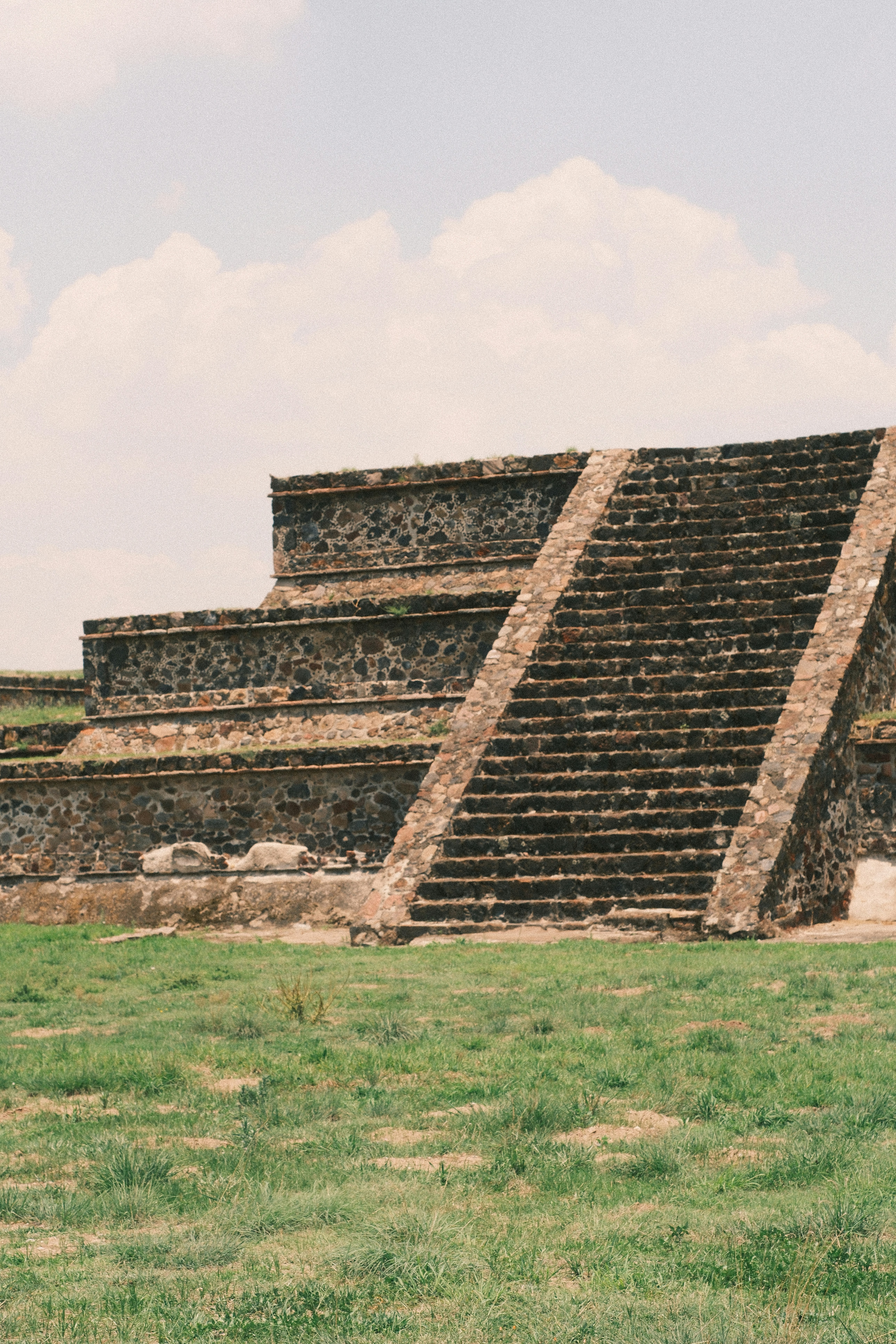 Stepped Stone Staircase Ascending Over Green Plain
