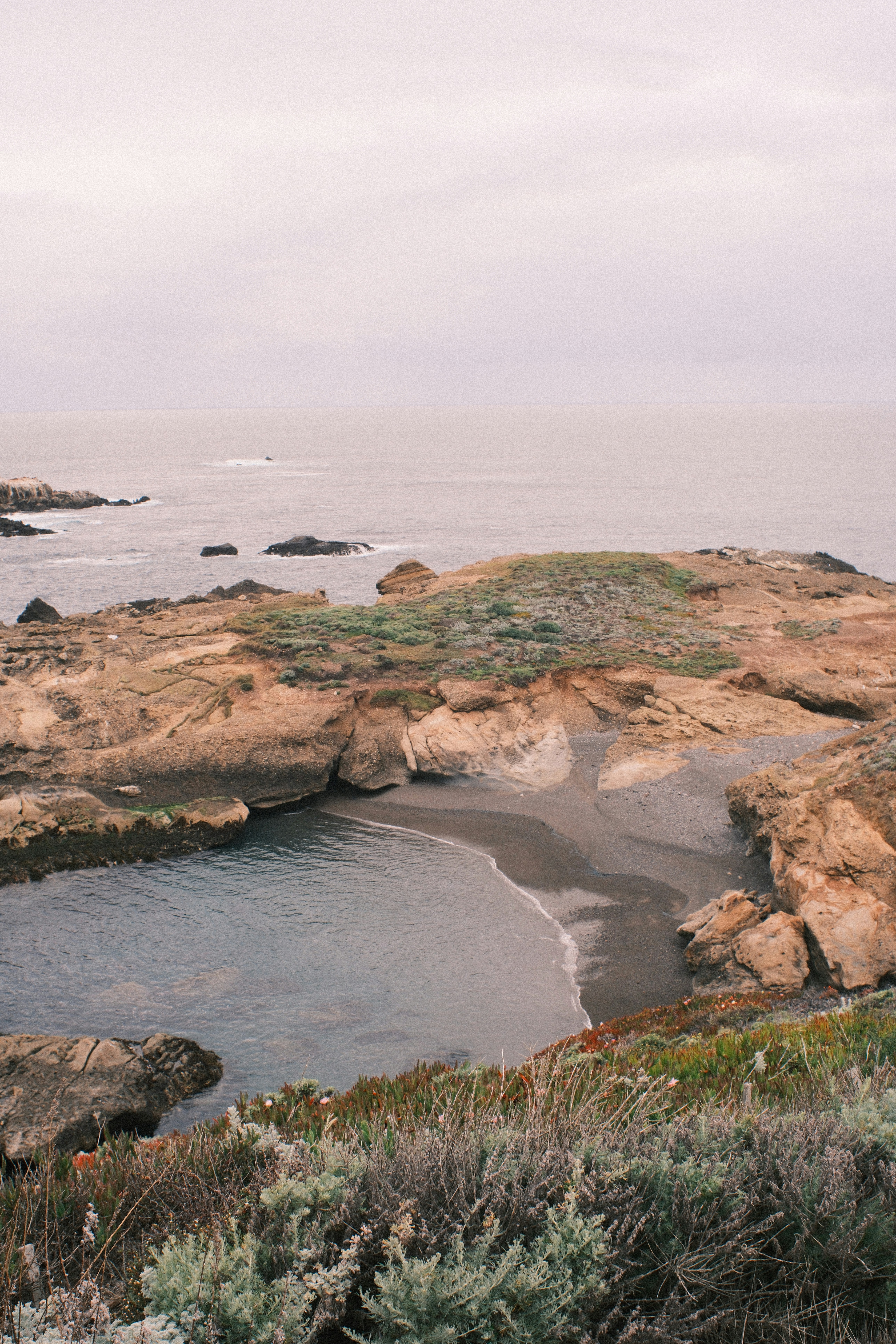 Coastal Rockscape Tucked Between Tide Pools