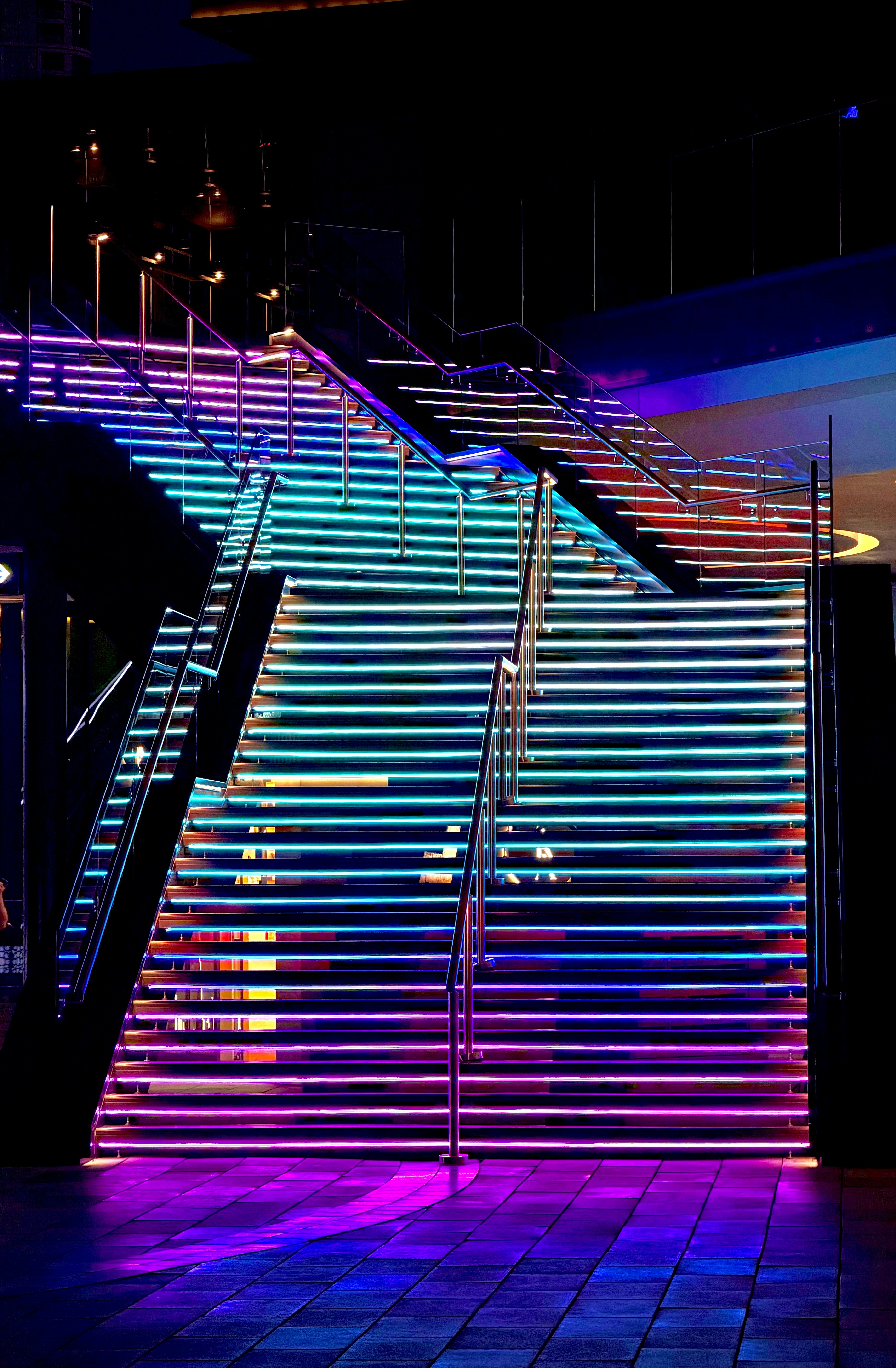 Neon Staircase Melt: Chromatic Steps of Night