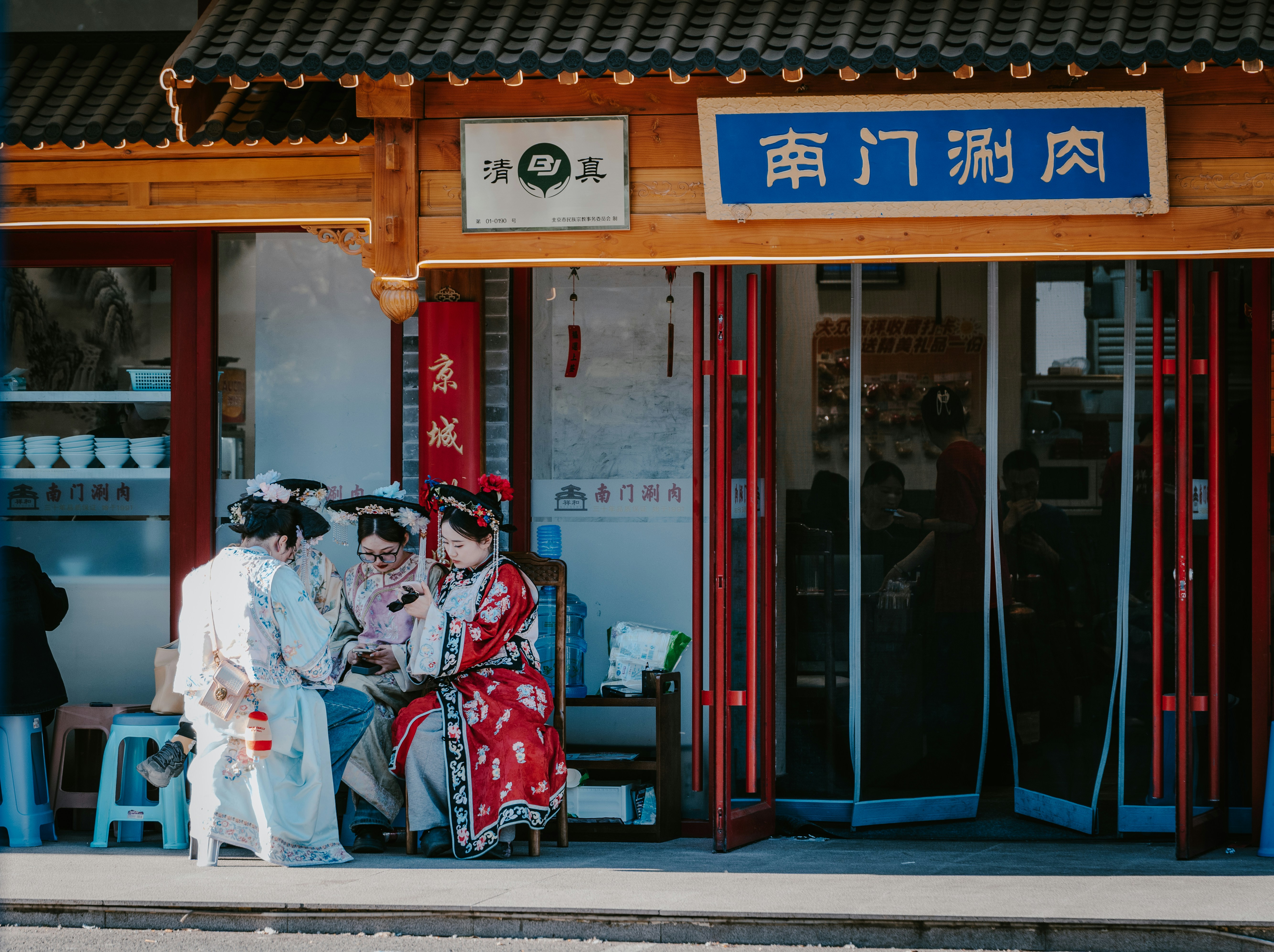 Seasoned Peking Opera Seated under a Lacquered Roof