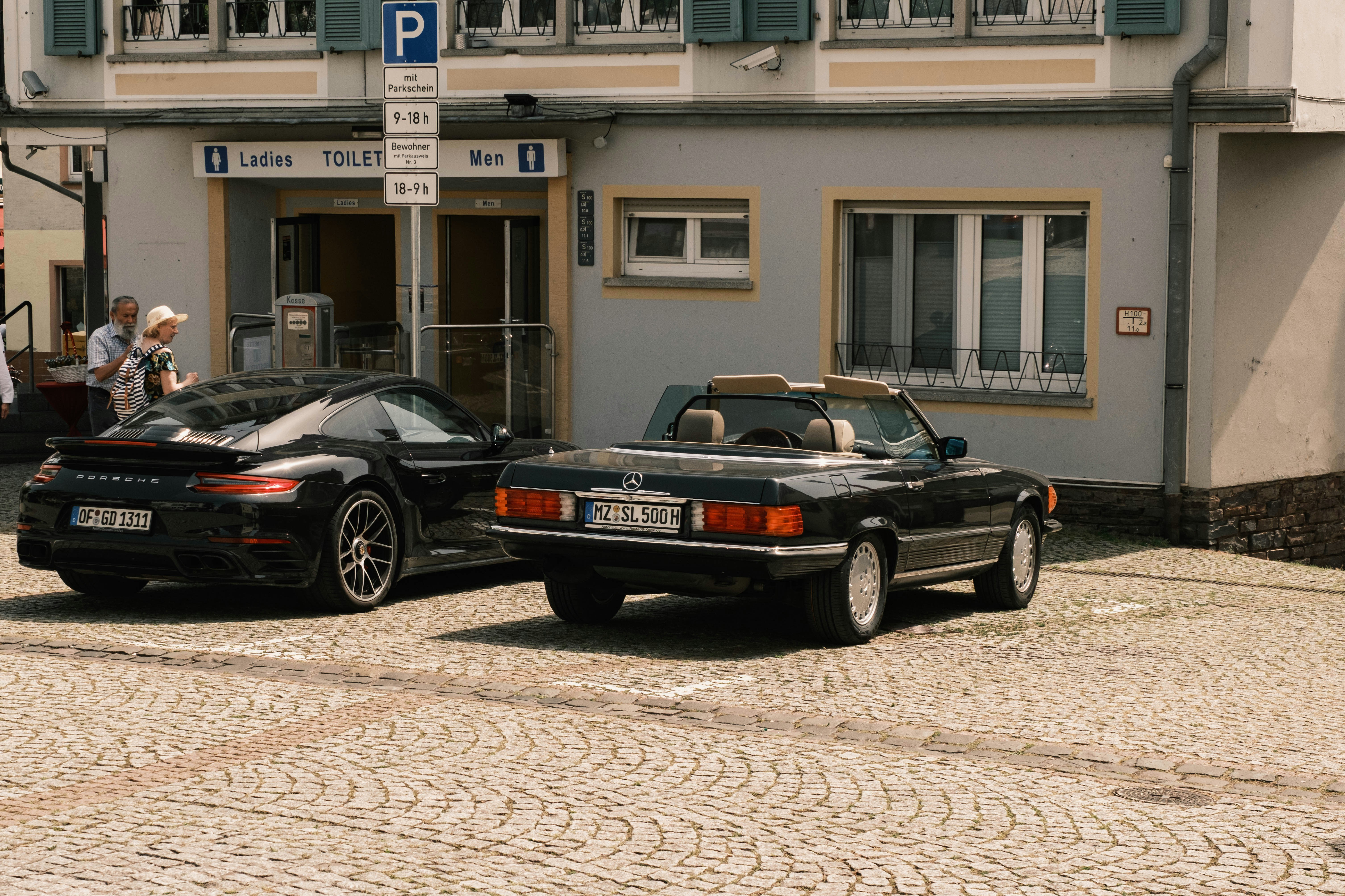 Pastel Street Echoes: Classic Convertible Meets Modern Porsche