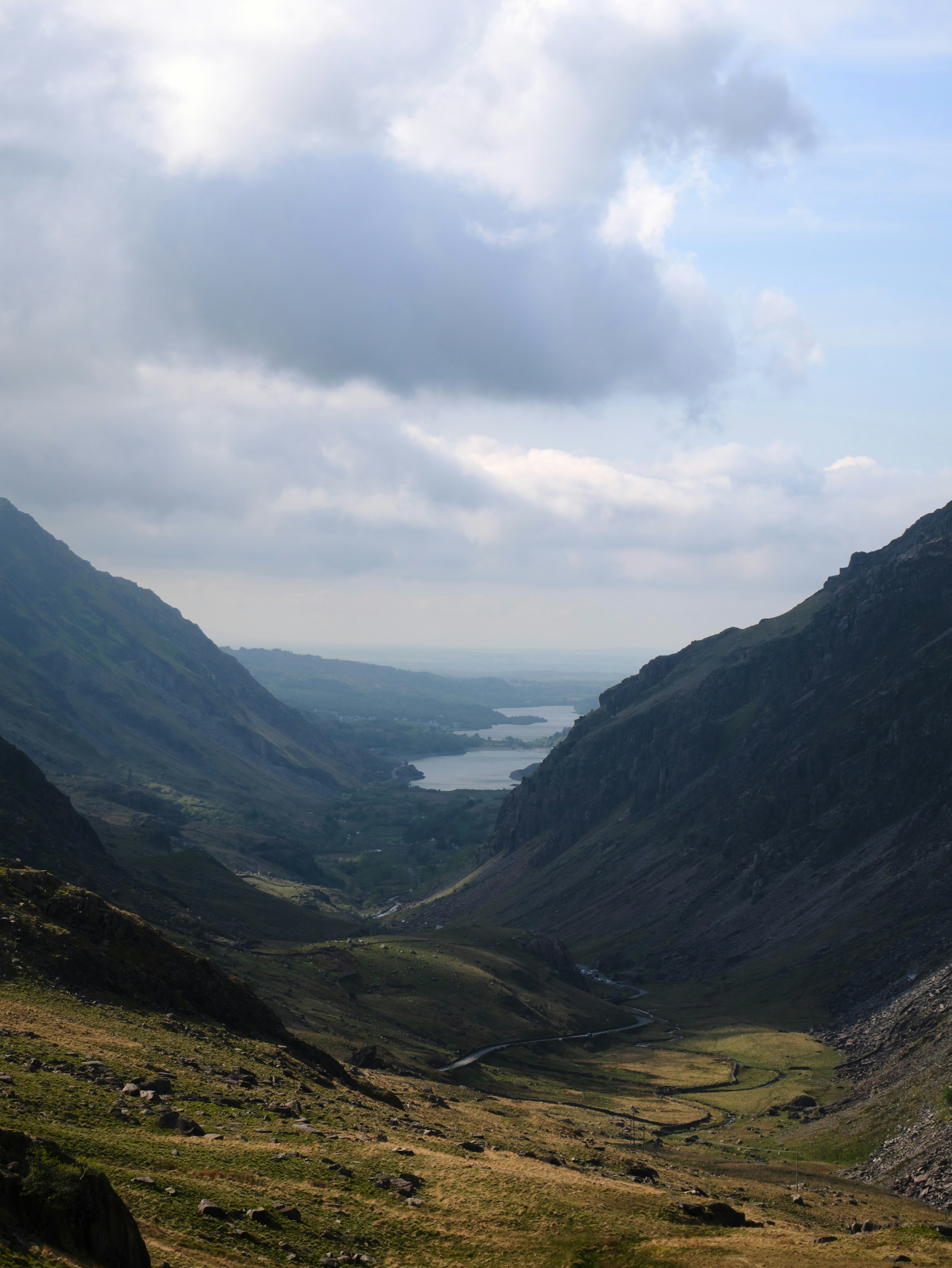 Valley Rift: A Quiet Ribbon of Water Between Verdant Slopes