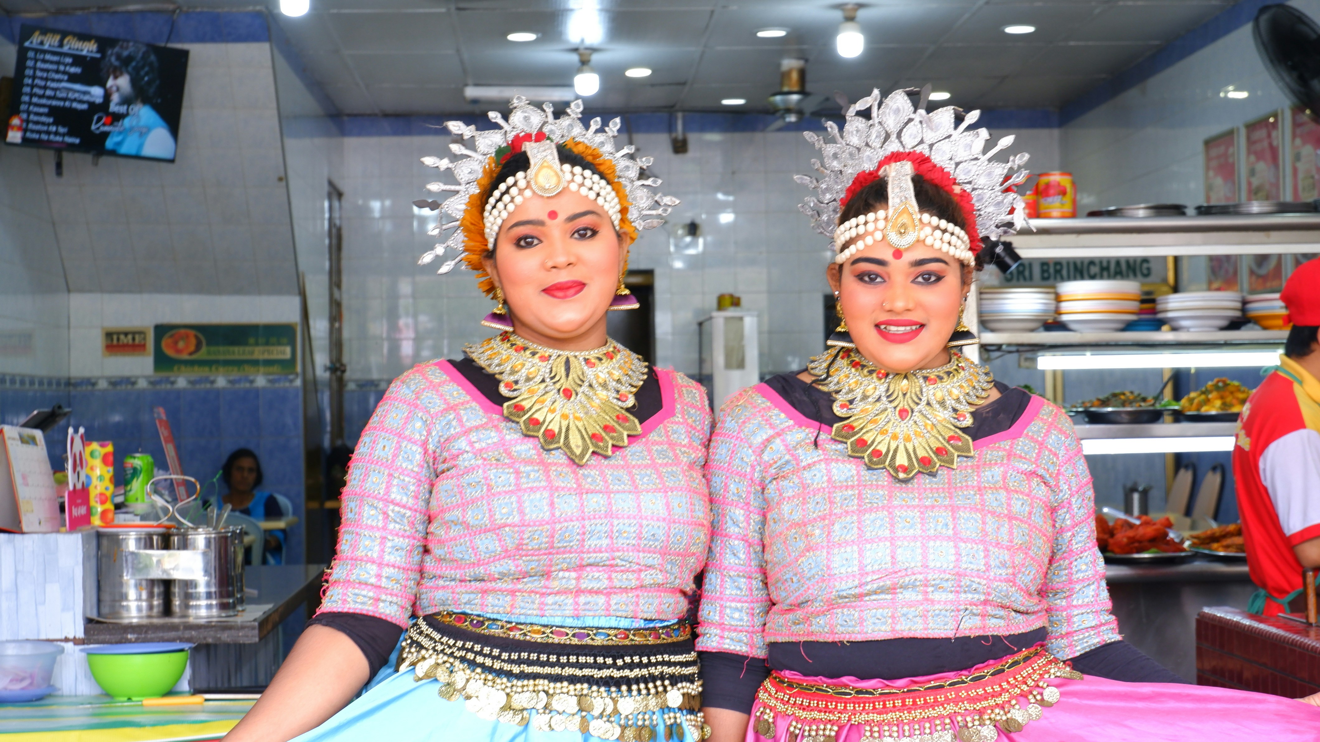 Traditional Dancers in Intricate Attire Take Center Stage