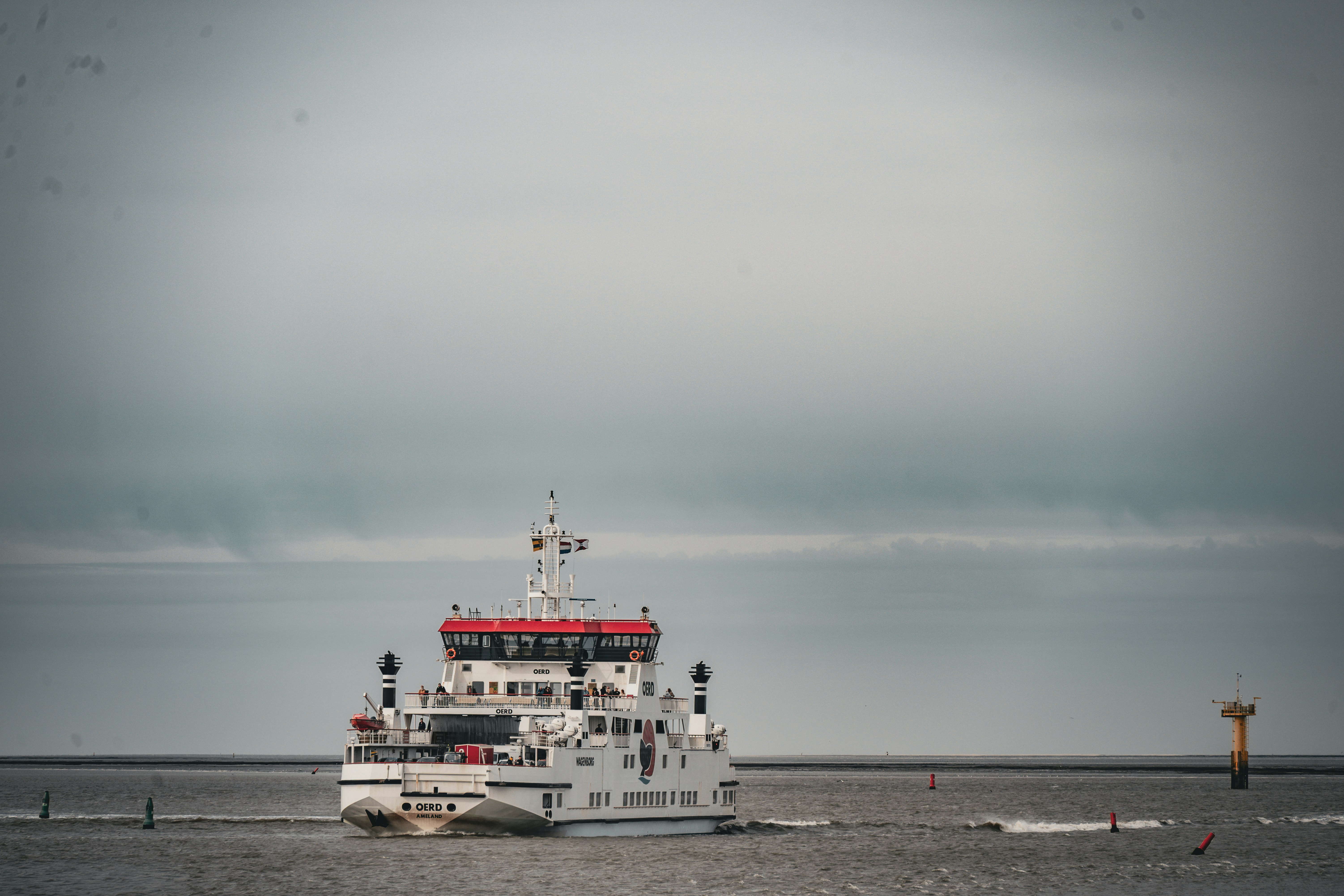 Coastal Ferry Cutting Through Calm Waters