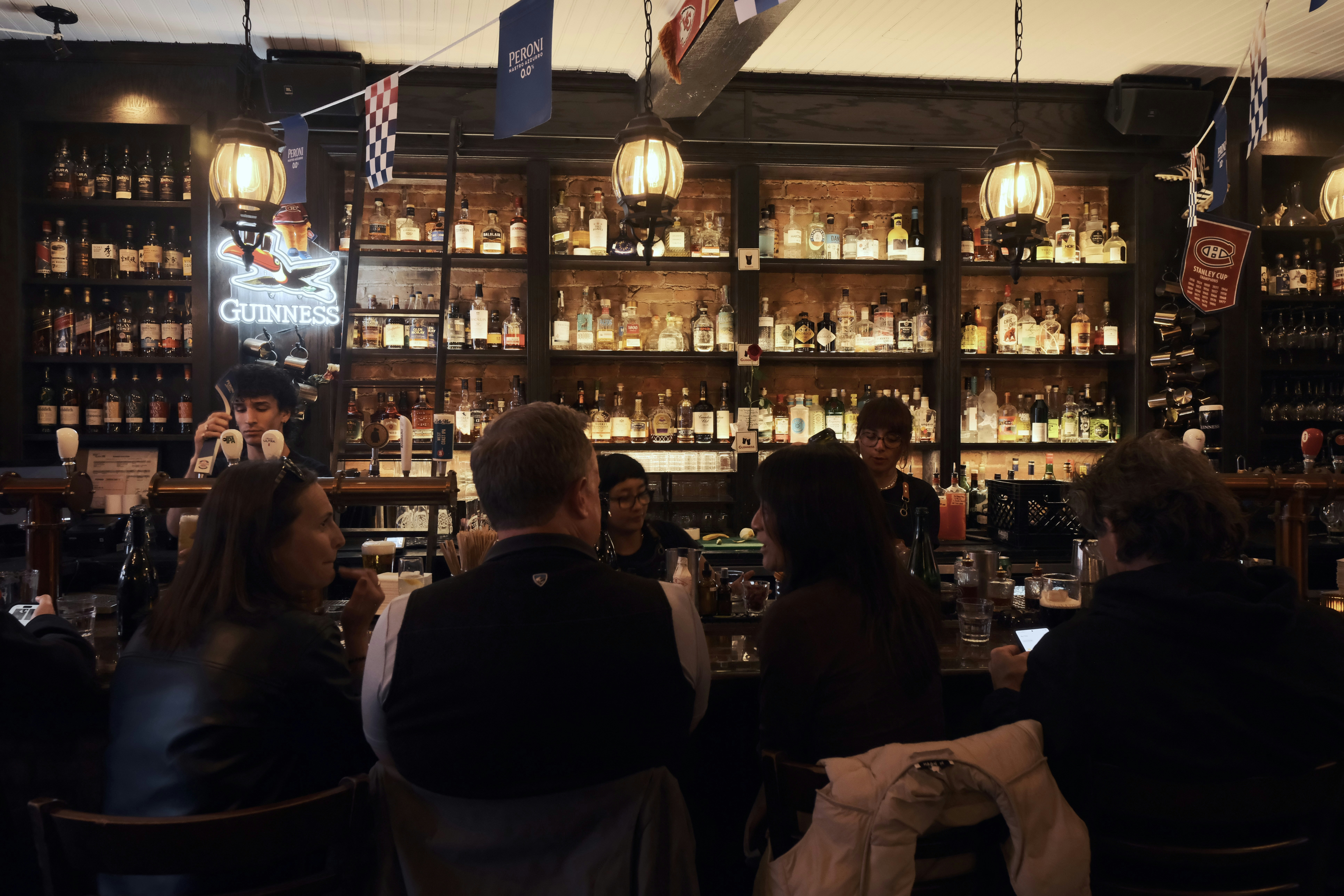 Warm Glasses and Whiskey Echoes: A Bar Conversation