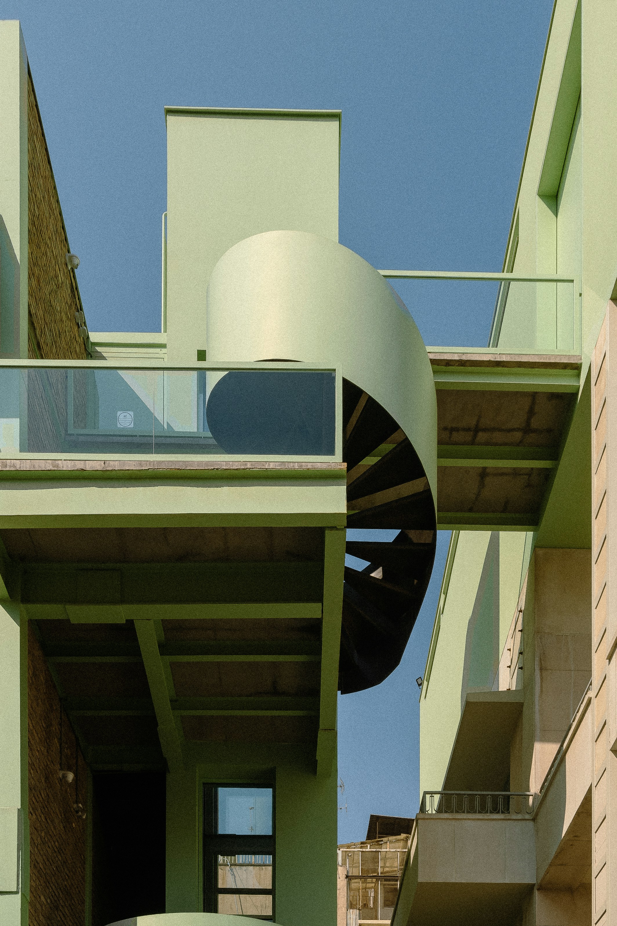 Green Spiral: Architecture of Light and Shadow