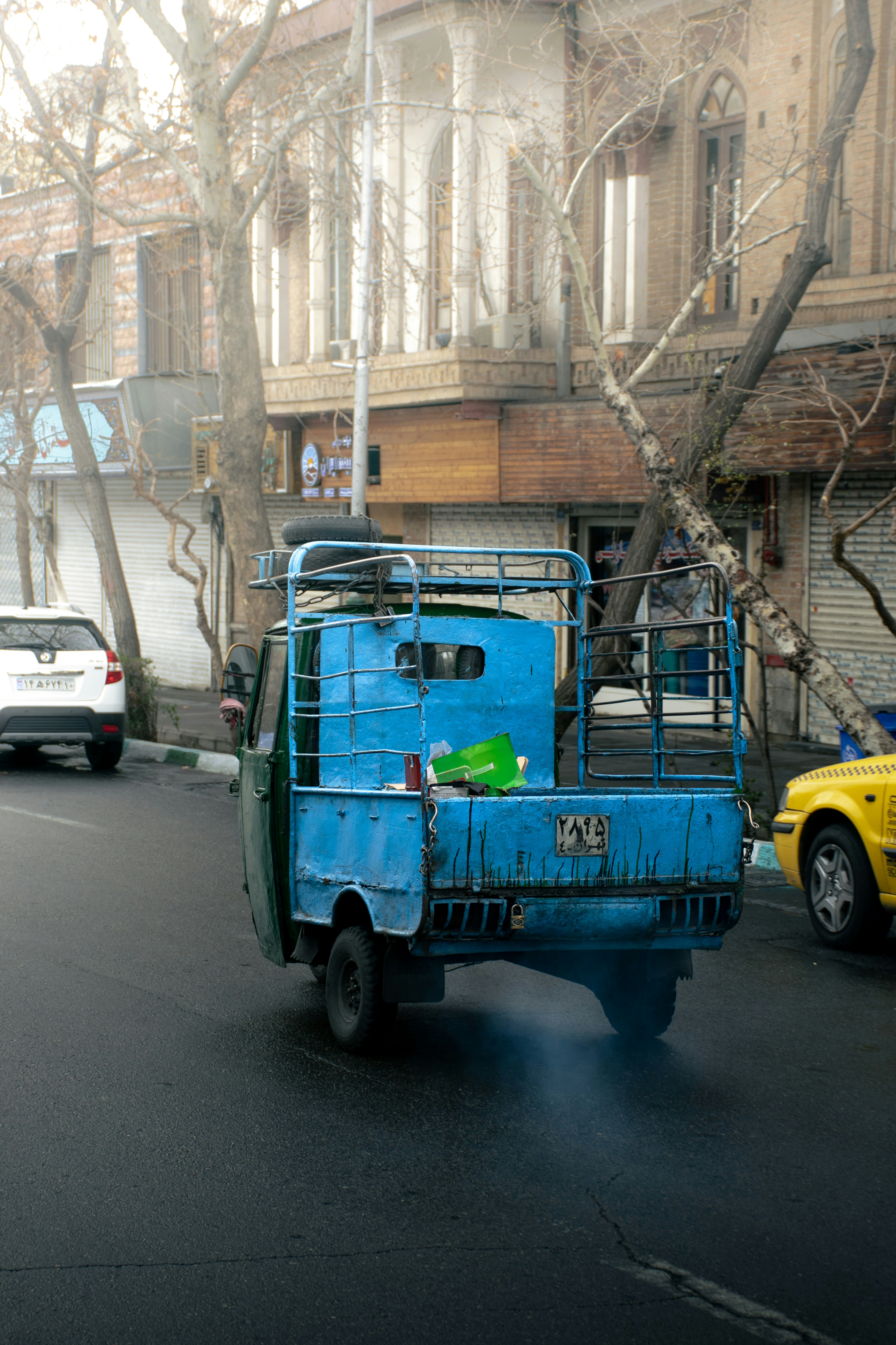 Blue Truck on a Quiet City Street
