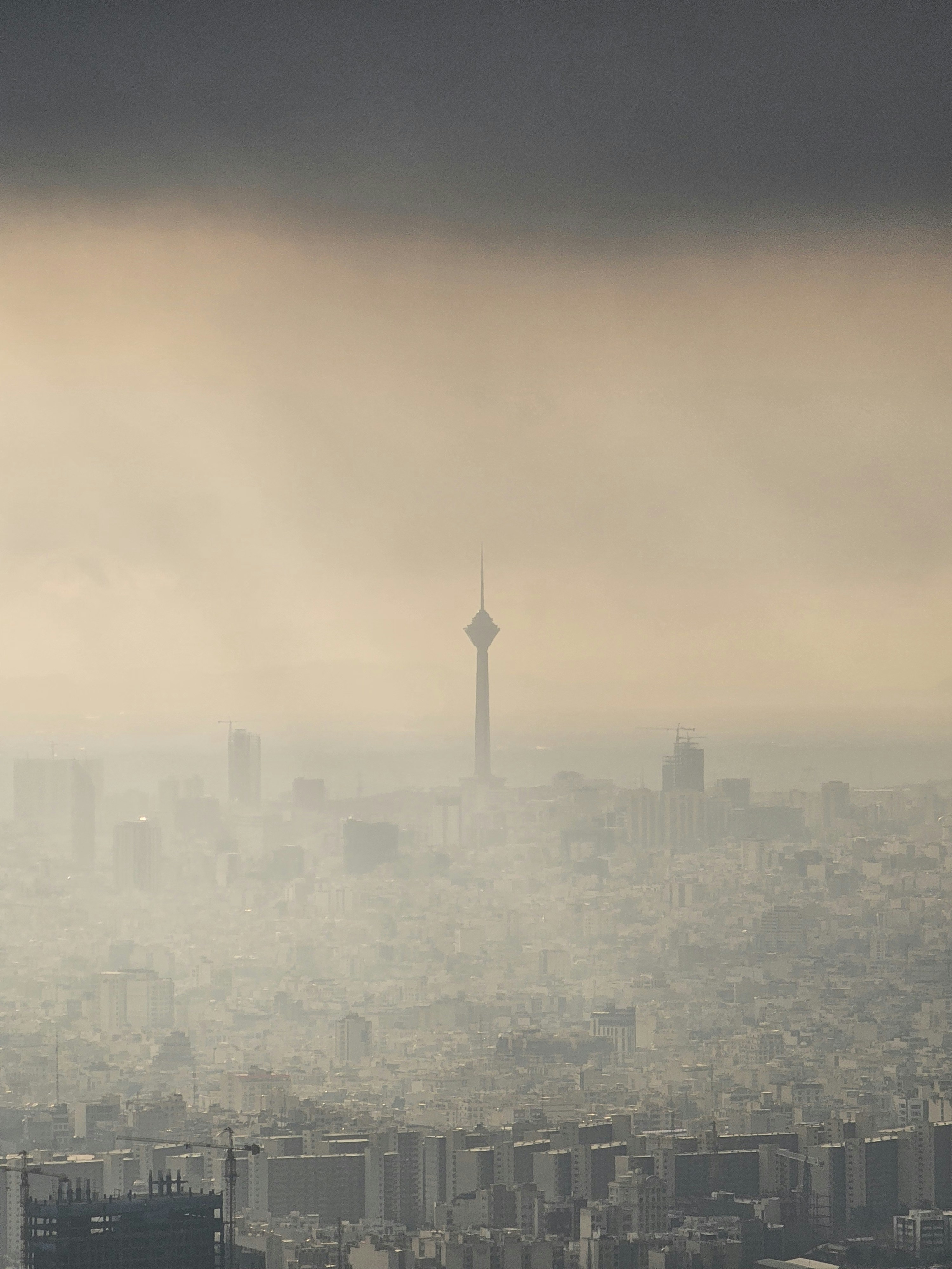 Hazy Dawn Over the Spire: City at Quiet Altitude