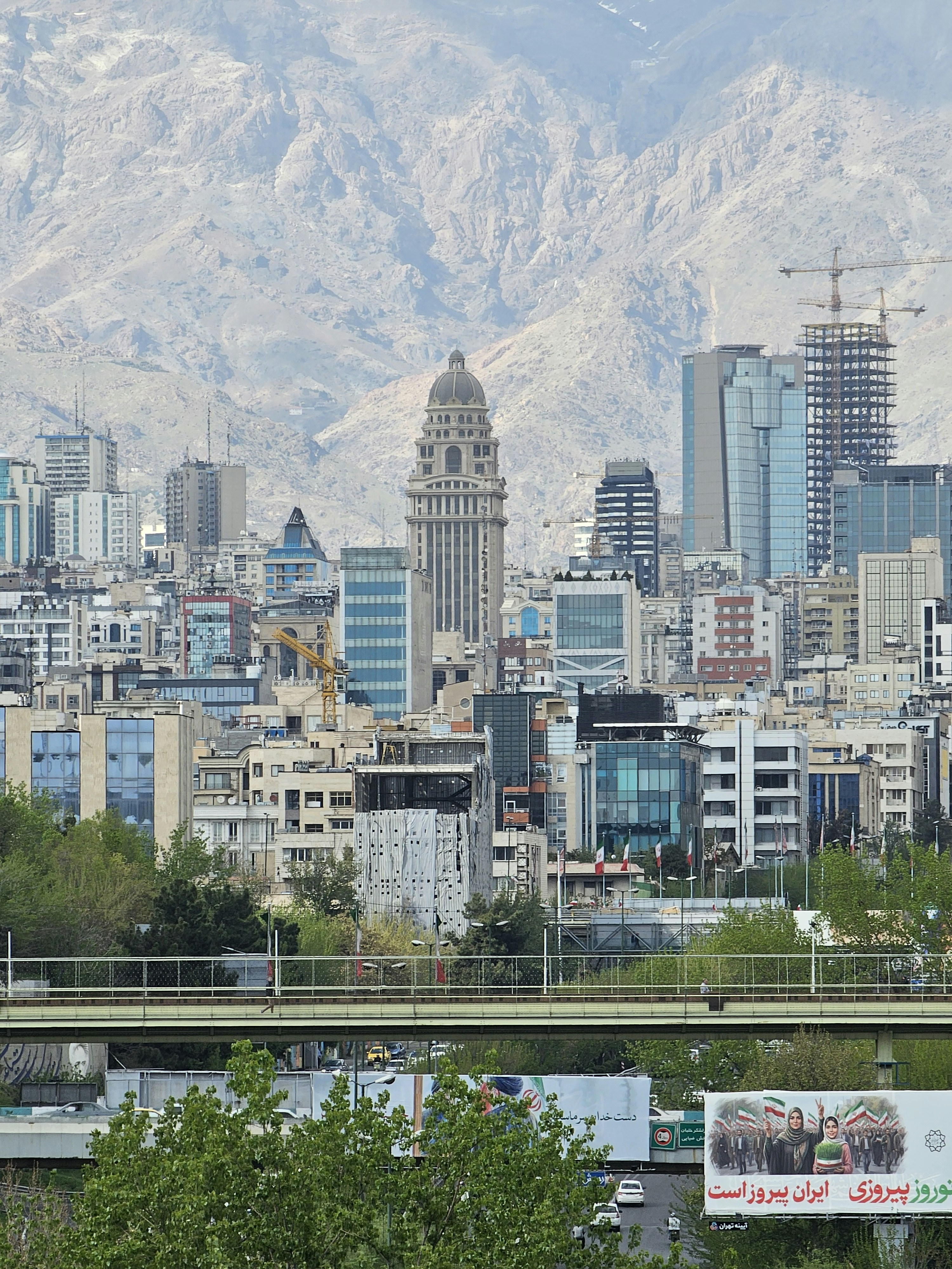 Urban Peaks: Skyline Against a Rugged Backdrop