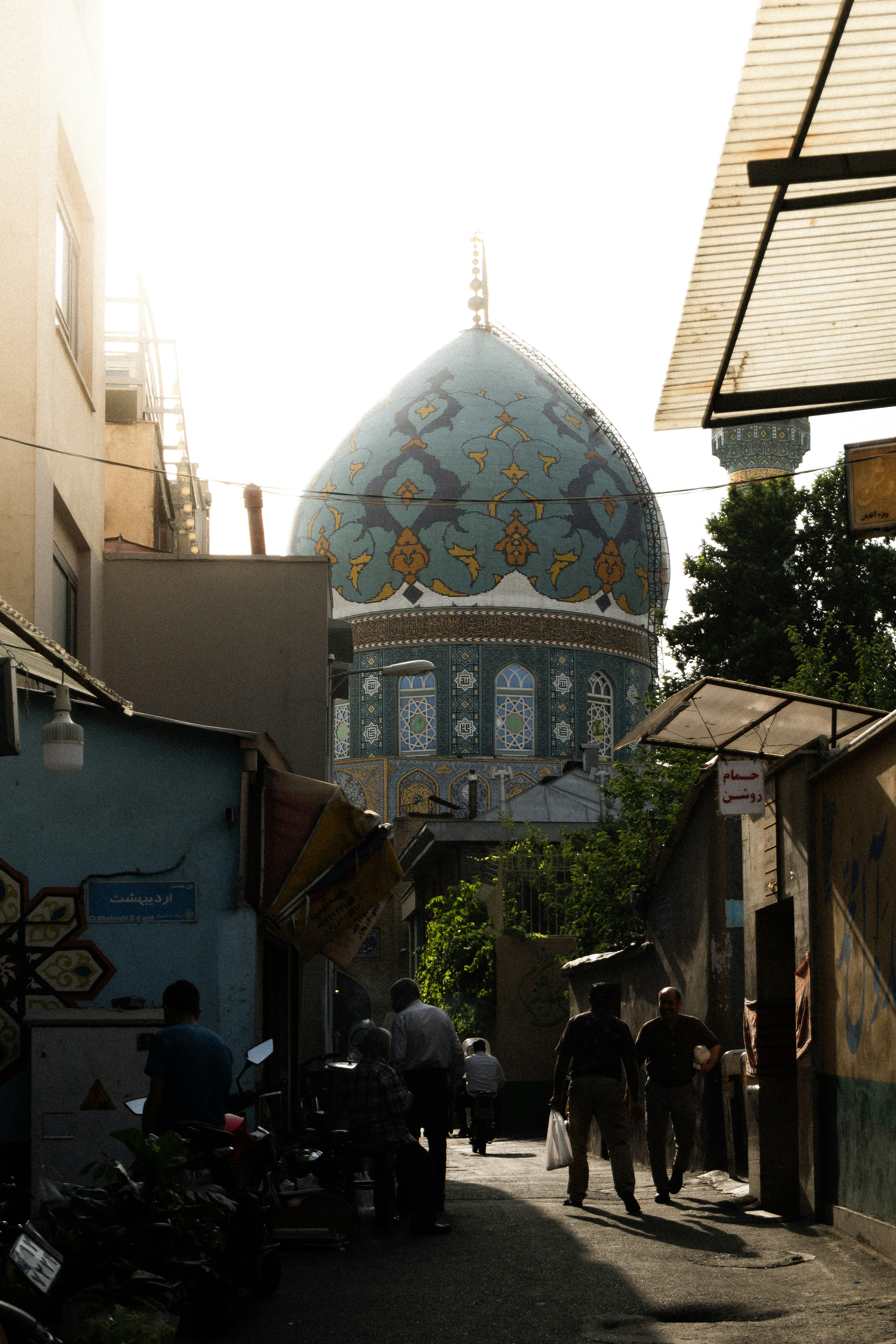 Yakubu Street Shrine: A Narrow Alley Framing a Domed Mosaic