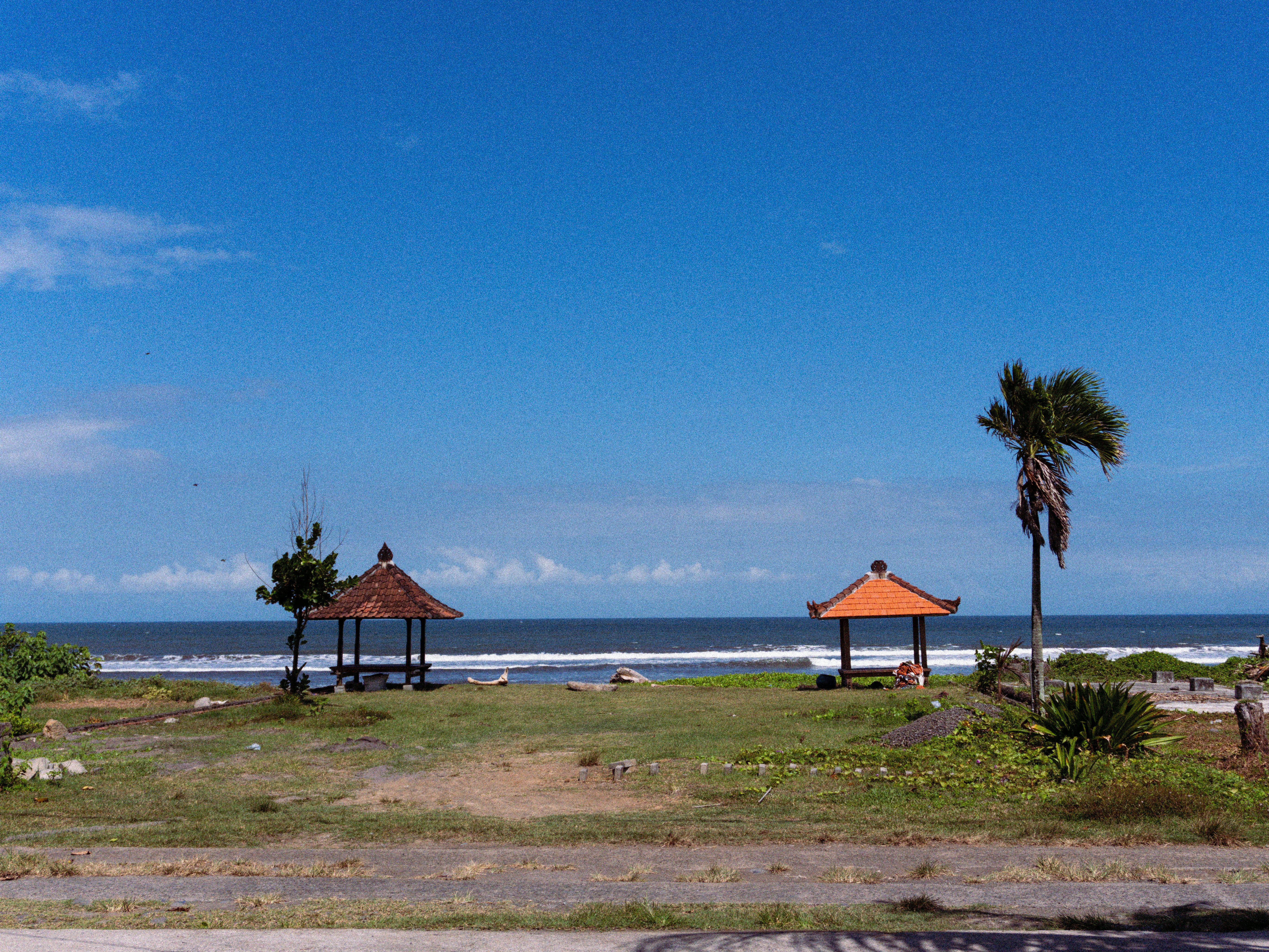 Seaside Huts under a Clear Blue Sky