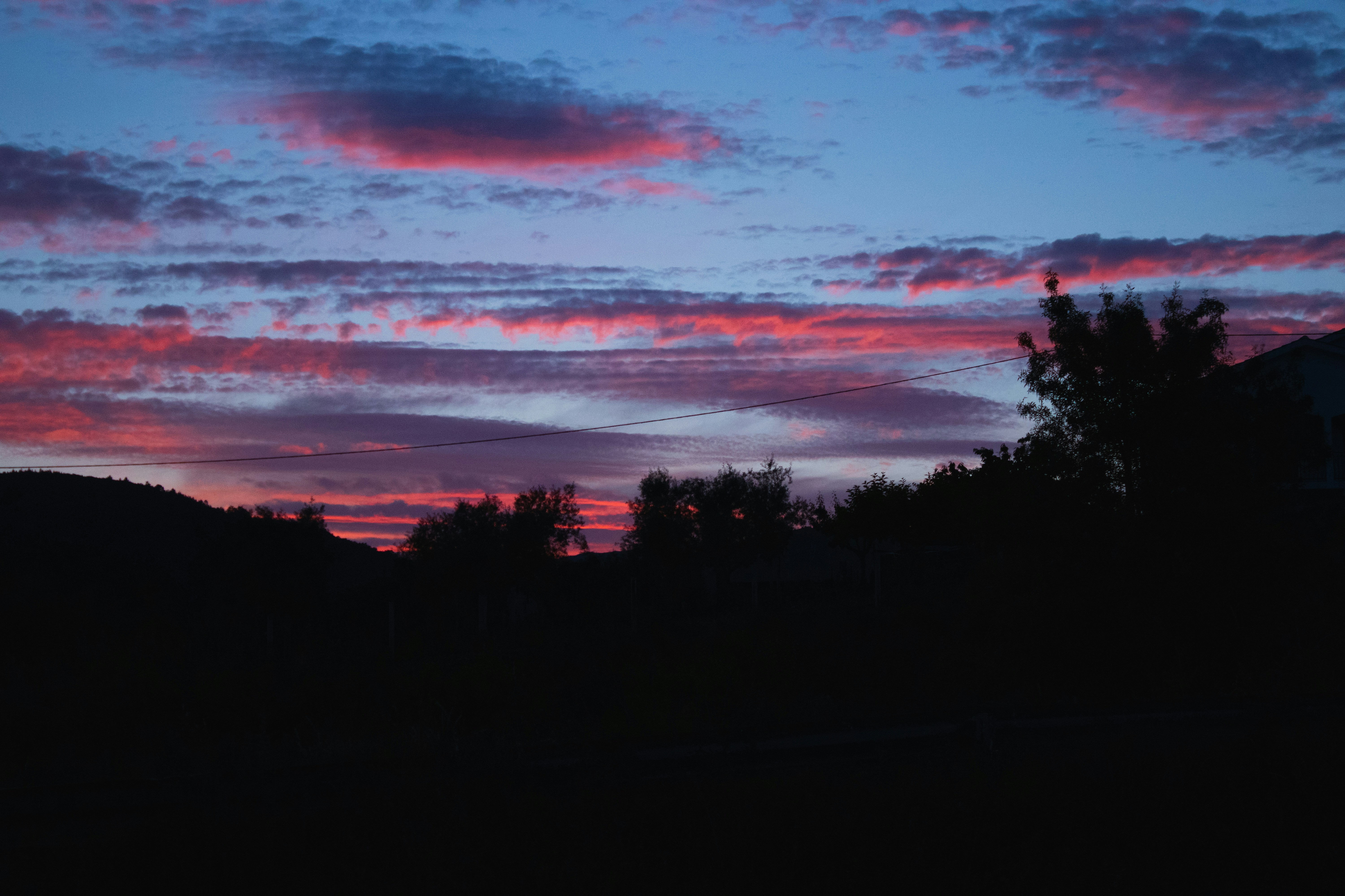 Twilight Ridge: Silhouettes Against a Velvet Sunset
