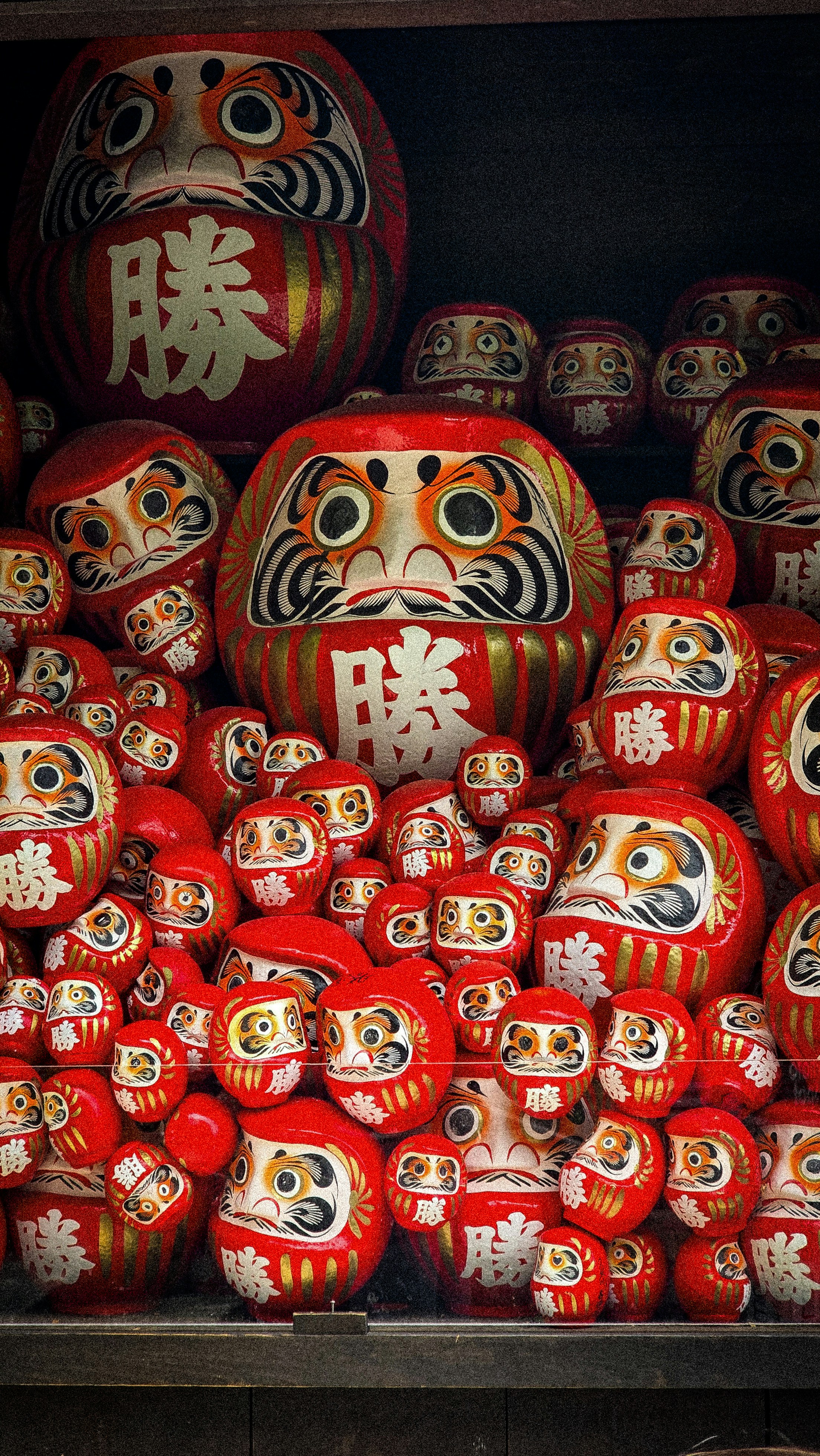Red Sea of Matryoshka: A Closer Look at a Towering Daruma Shelf