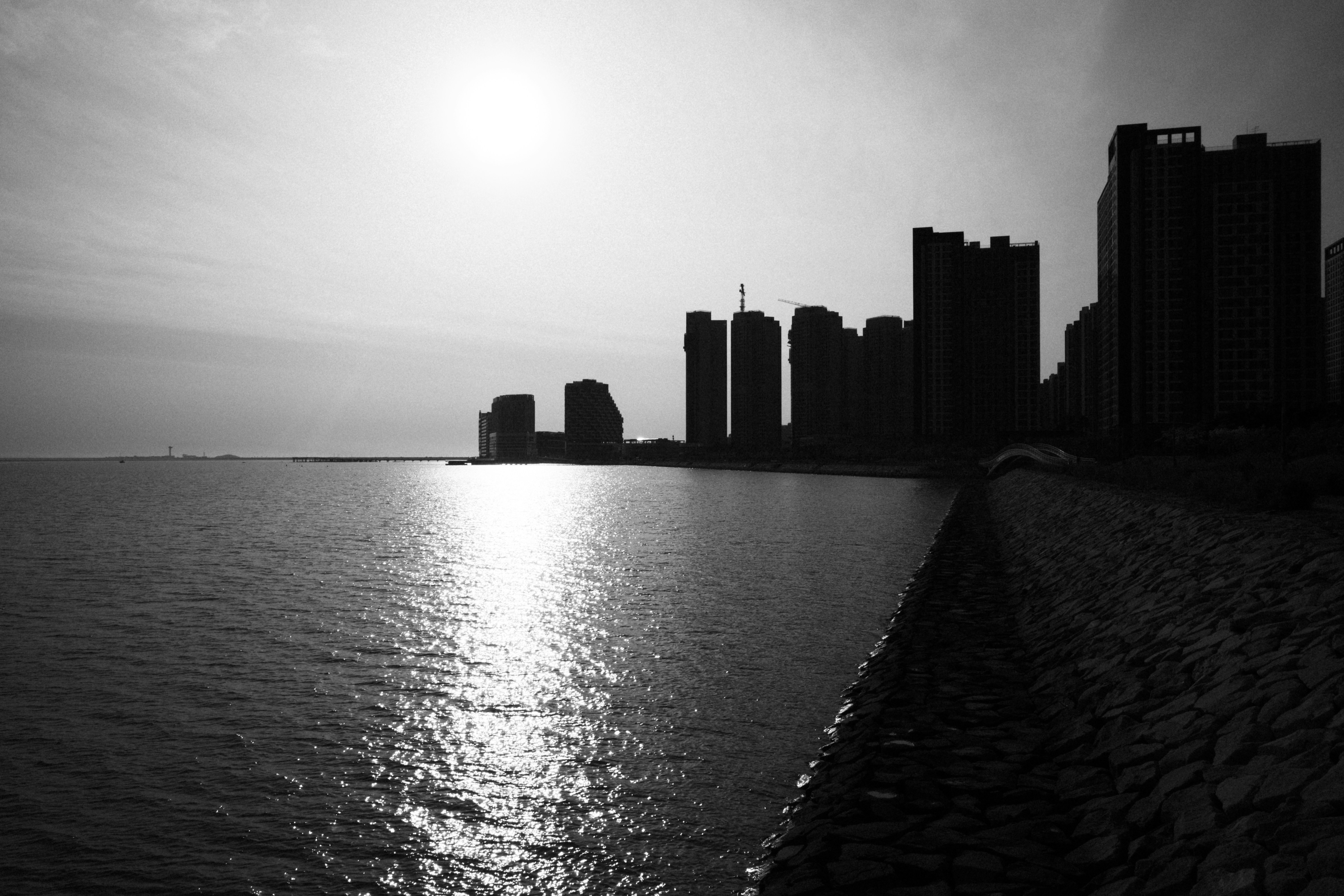 Sun-Glint and Skyline at Dusk along the Pier