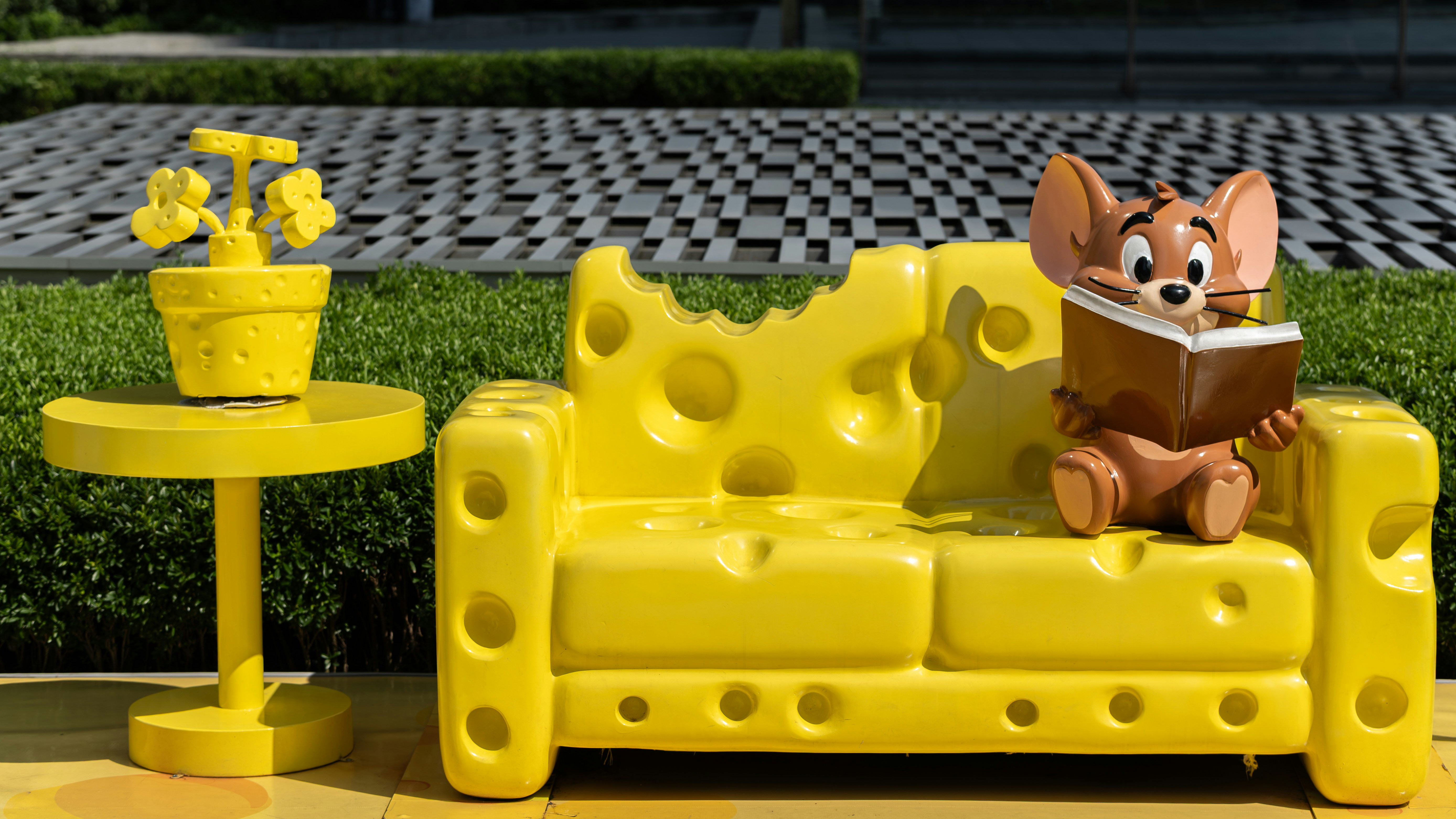 Sunny Playroom: A Bright Yellow Duo on a Plastic Couch