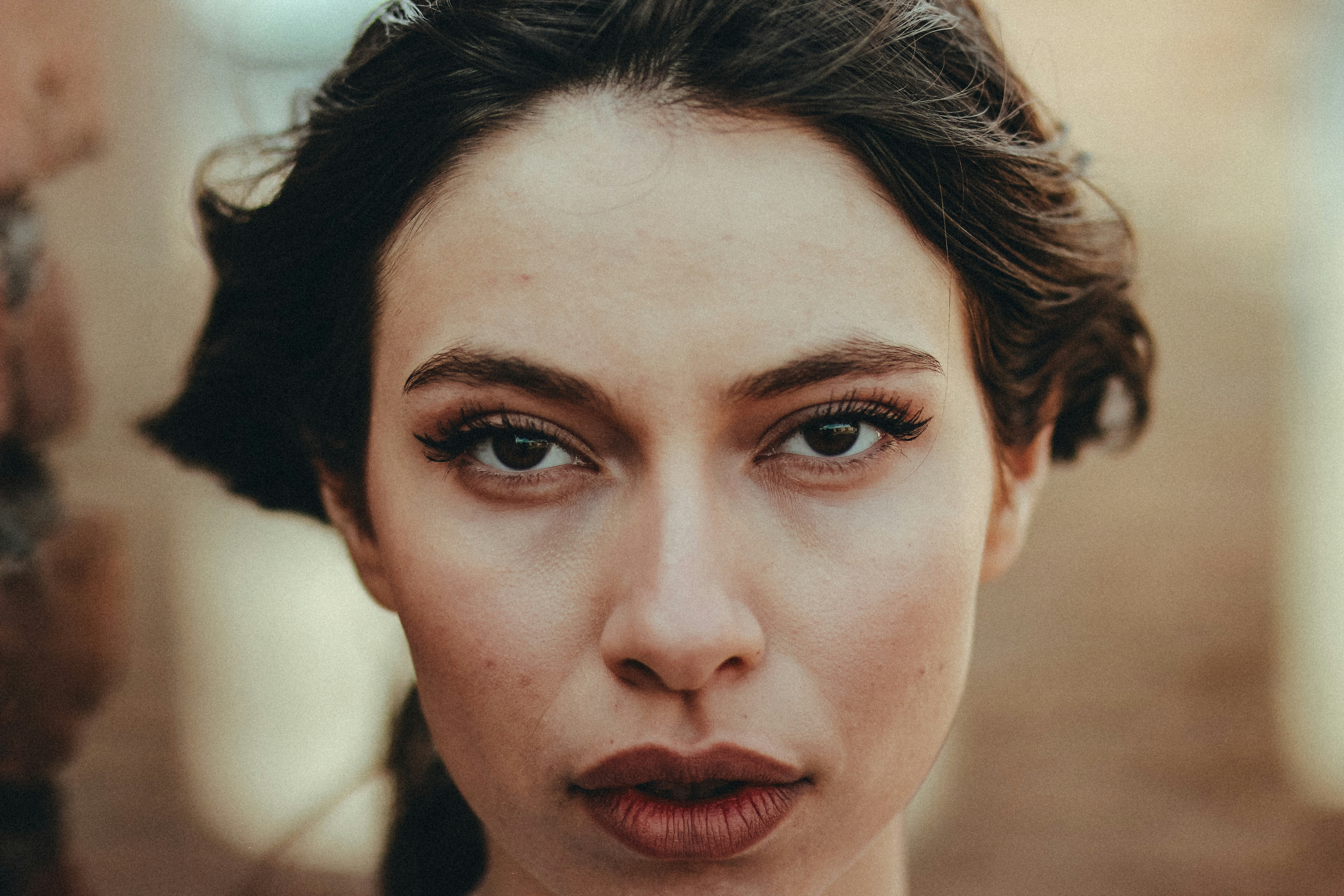 Direct Gaze: Close-Up of a Woman's Face with Intimate Expression