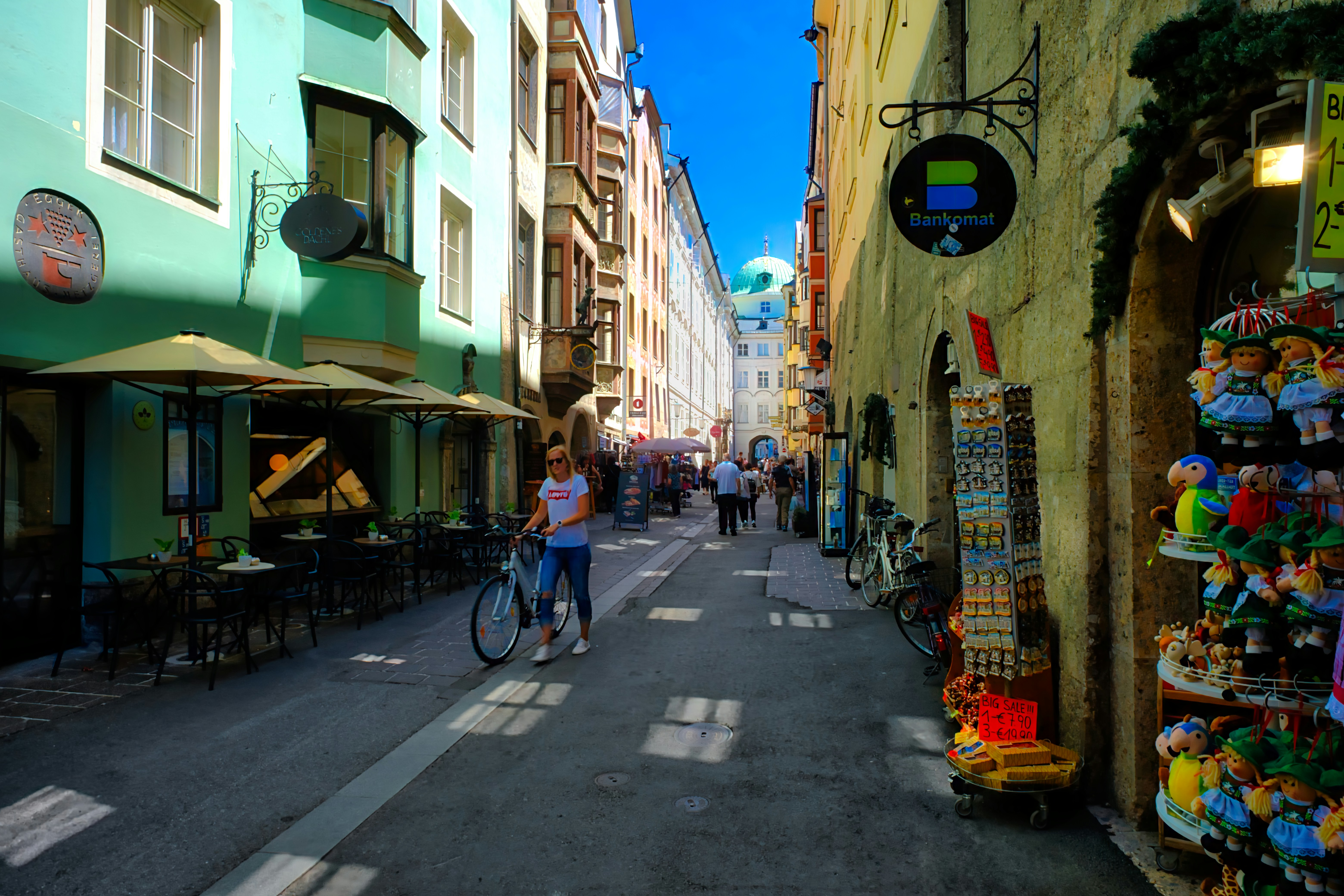 Pastel Streetcar: A Sunlit Mediterranean Alley Comes Alive