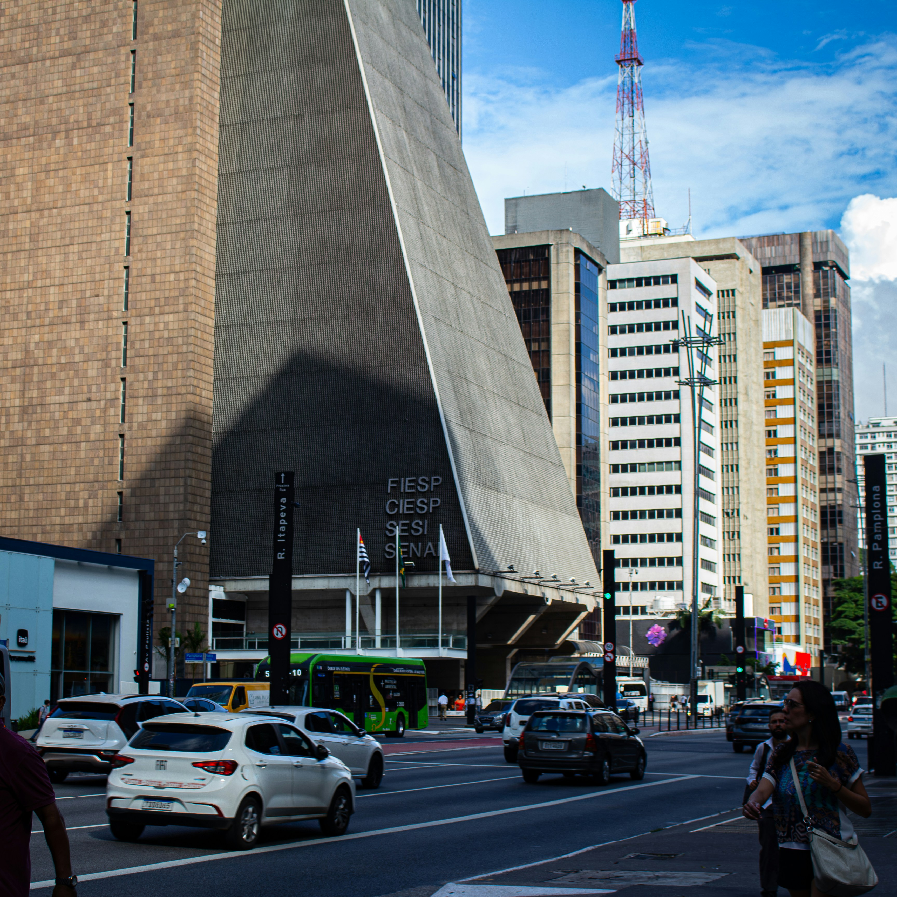 Urban Concrete: A Tilted Monolith Over a Busy Street