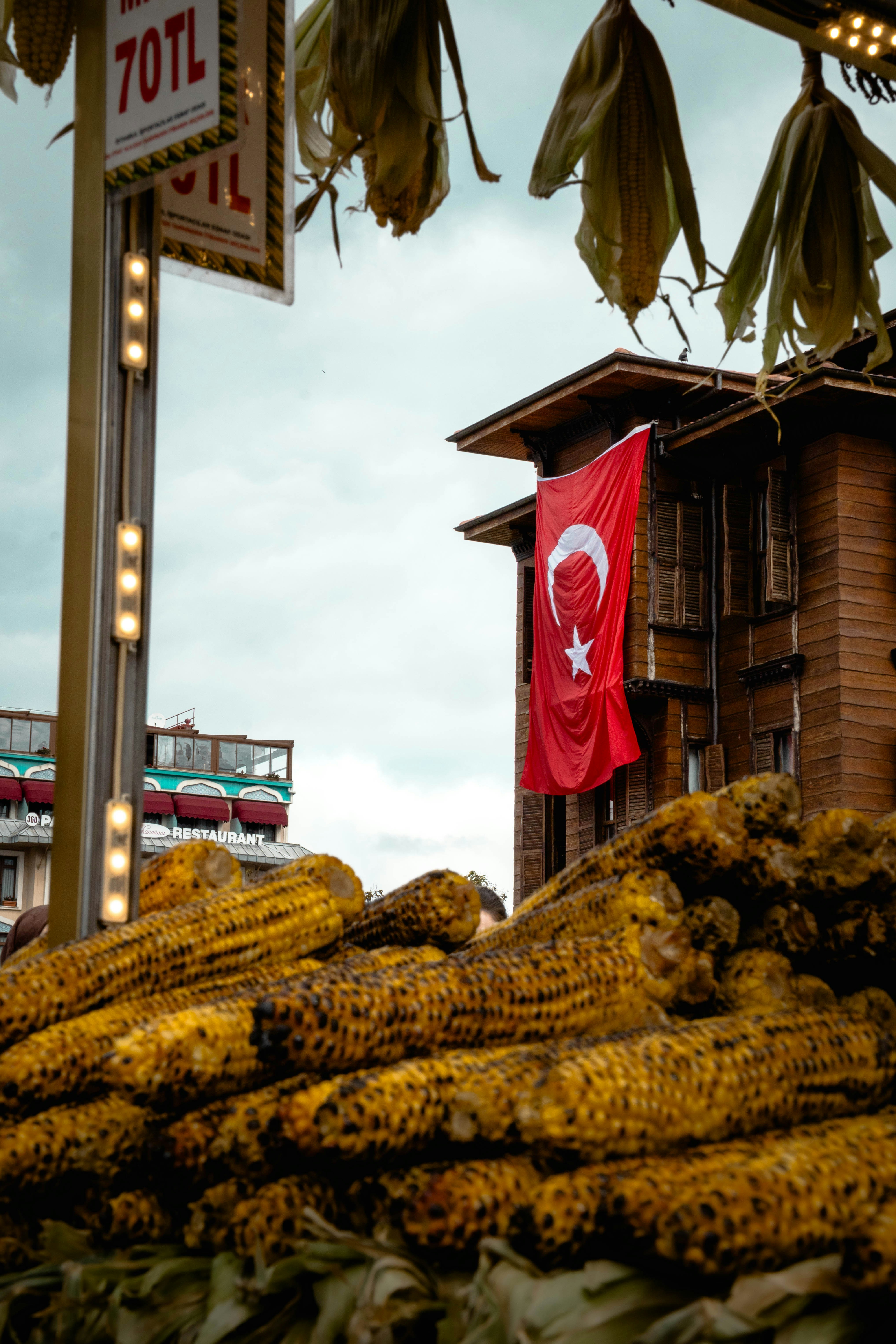 Turkish Flag Over a Market with Roasted Corn