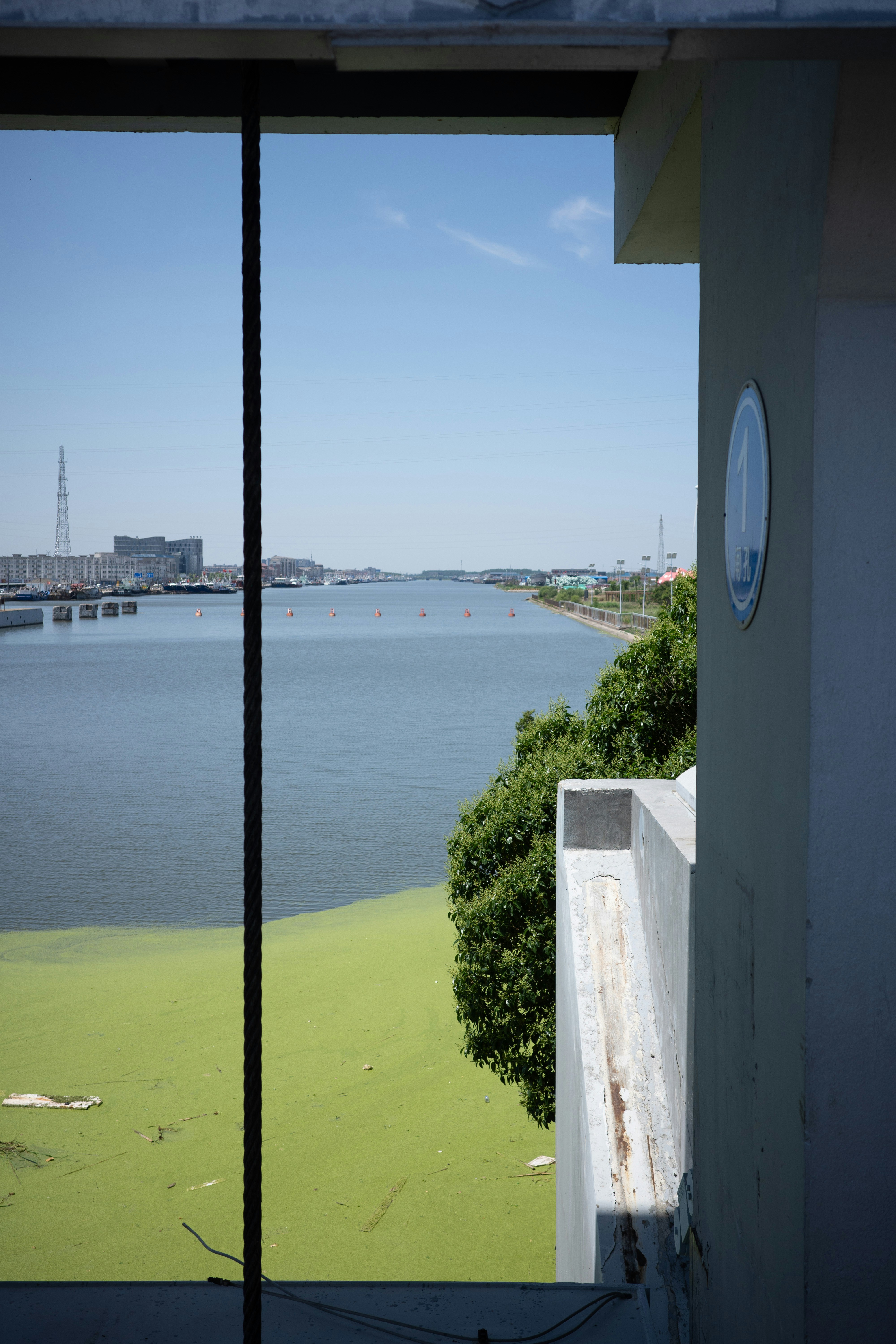 Harbor View Through a Narrow Frame