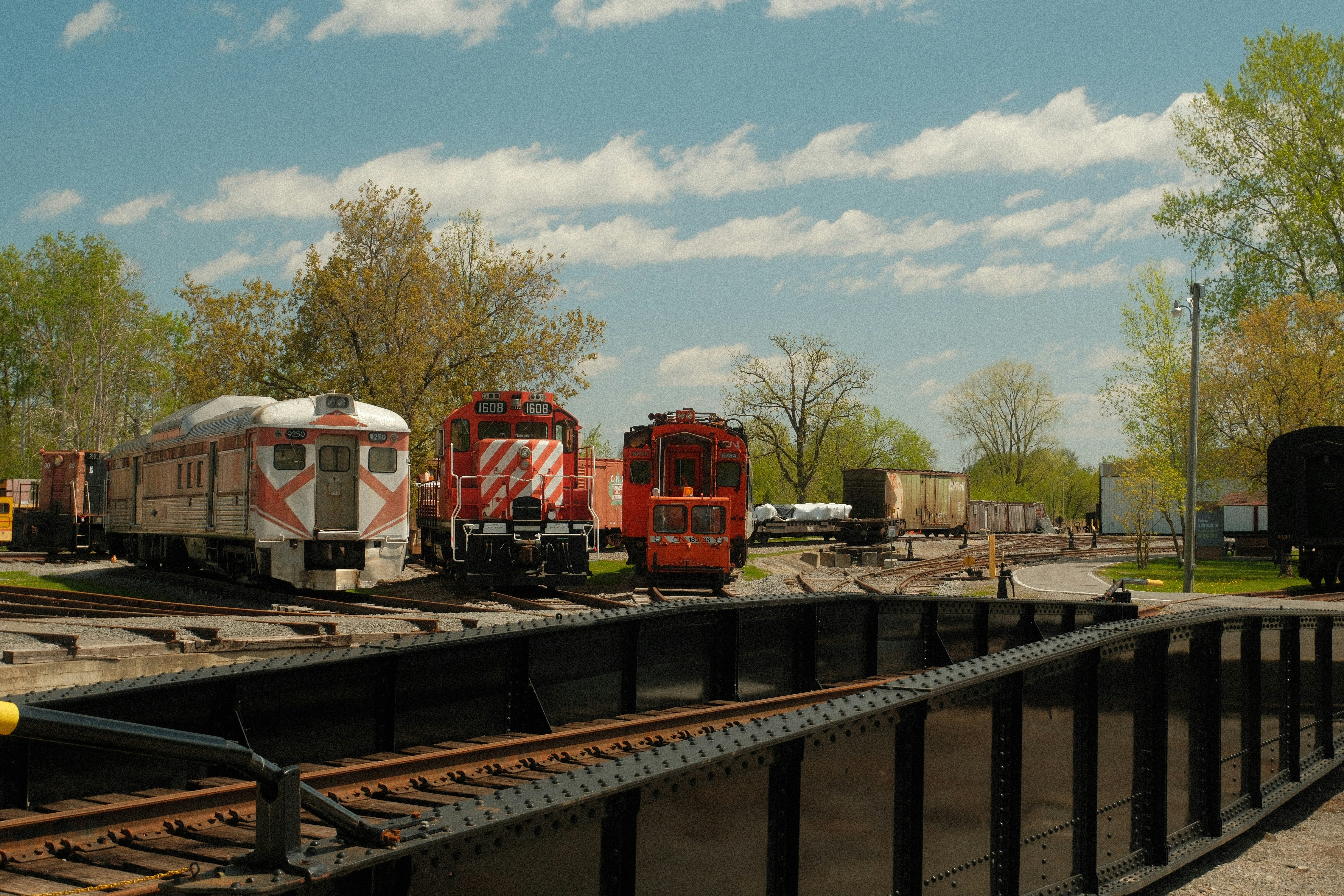 Rail Yard in Sunrise Light: Locomotives Rest Along the Platform