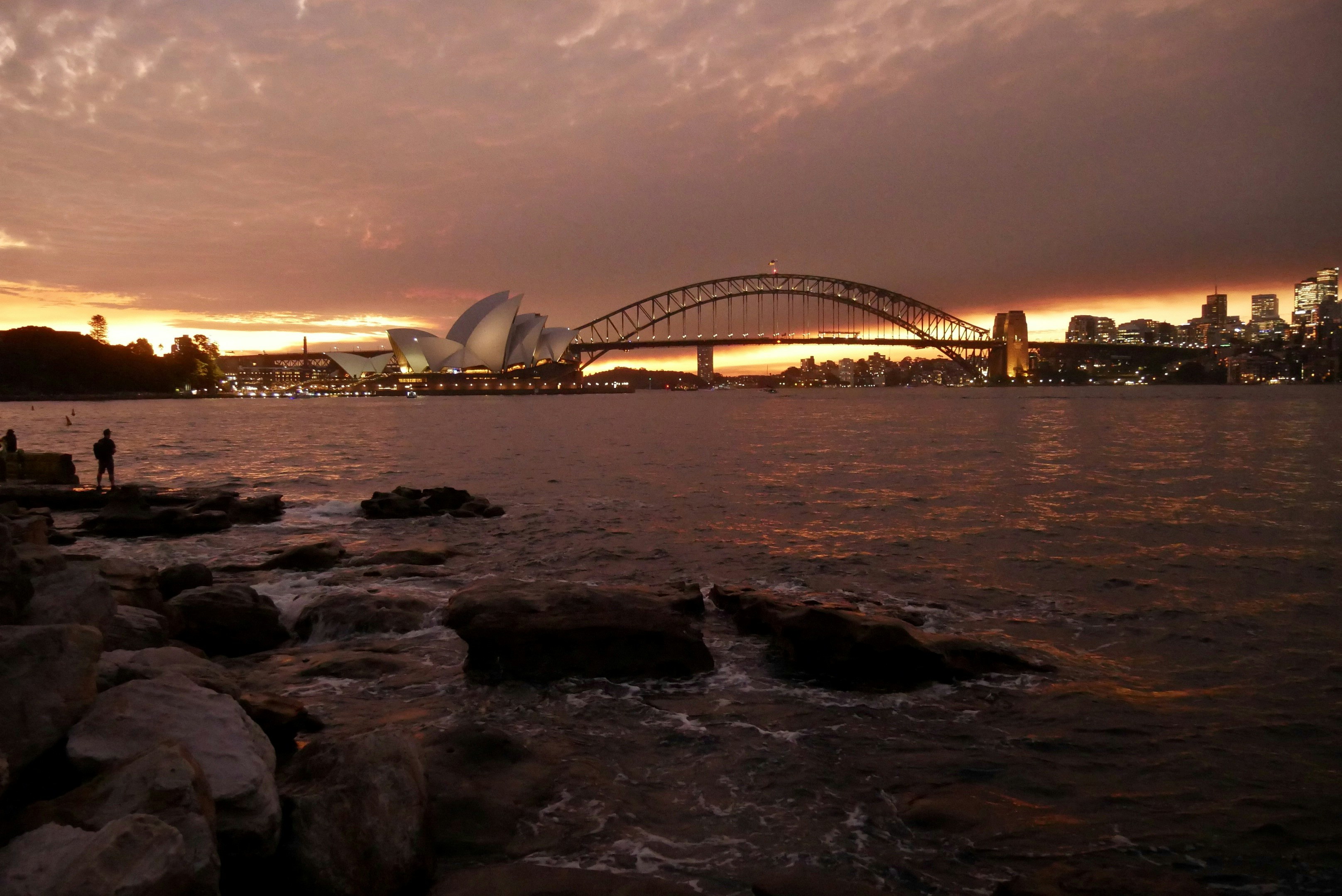 Sunset Over Sydney: Rocks, Harbour, and the Opera Glow