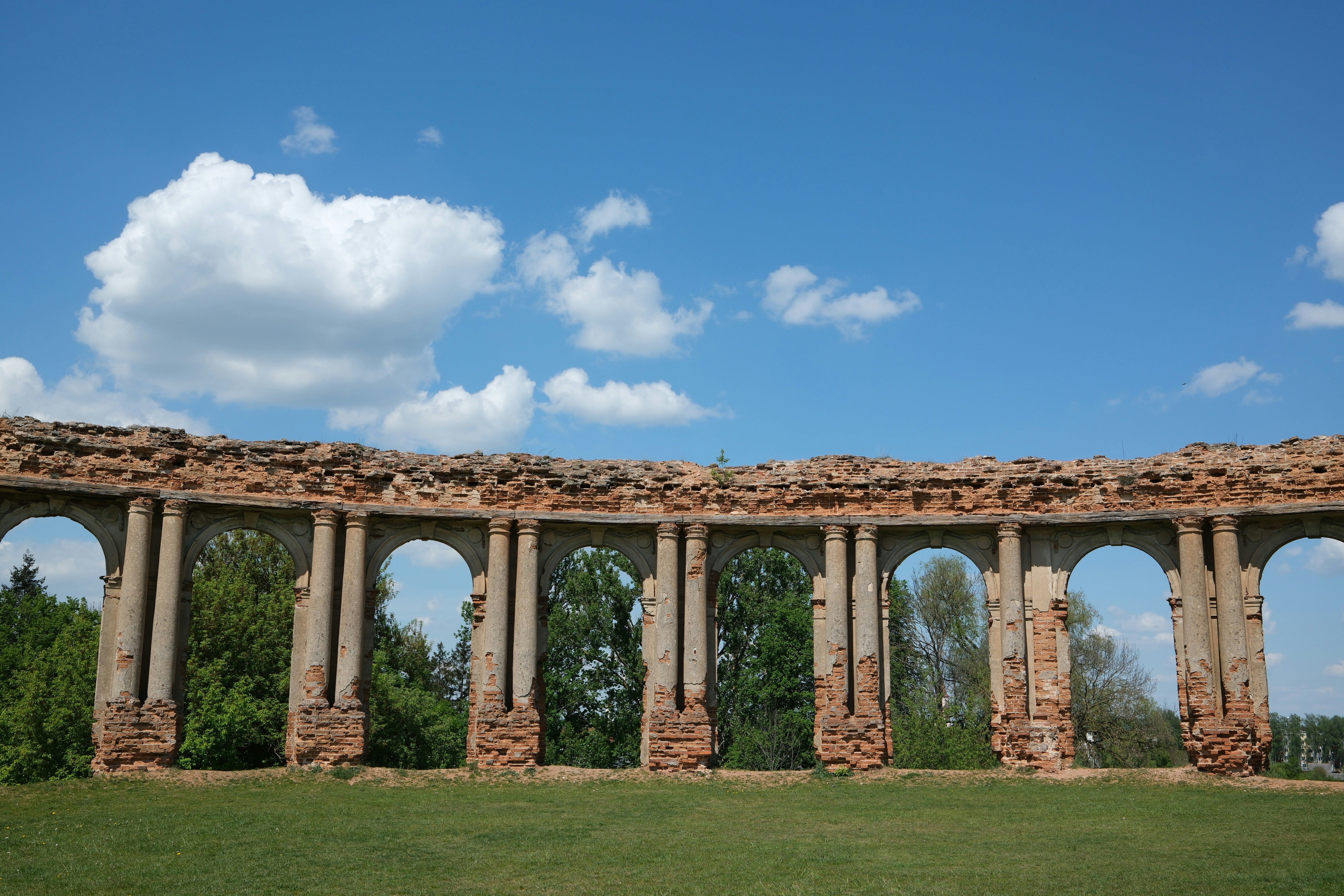 Ancient Viaduct Arches Beneath Cerulean Sky