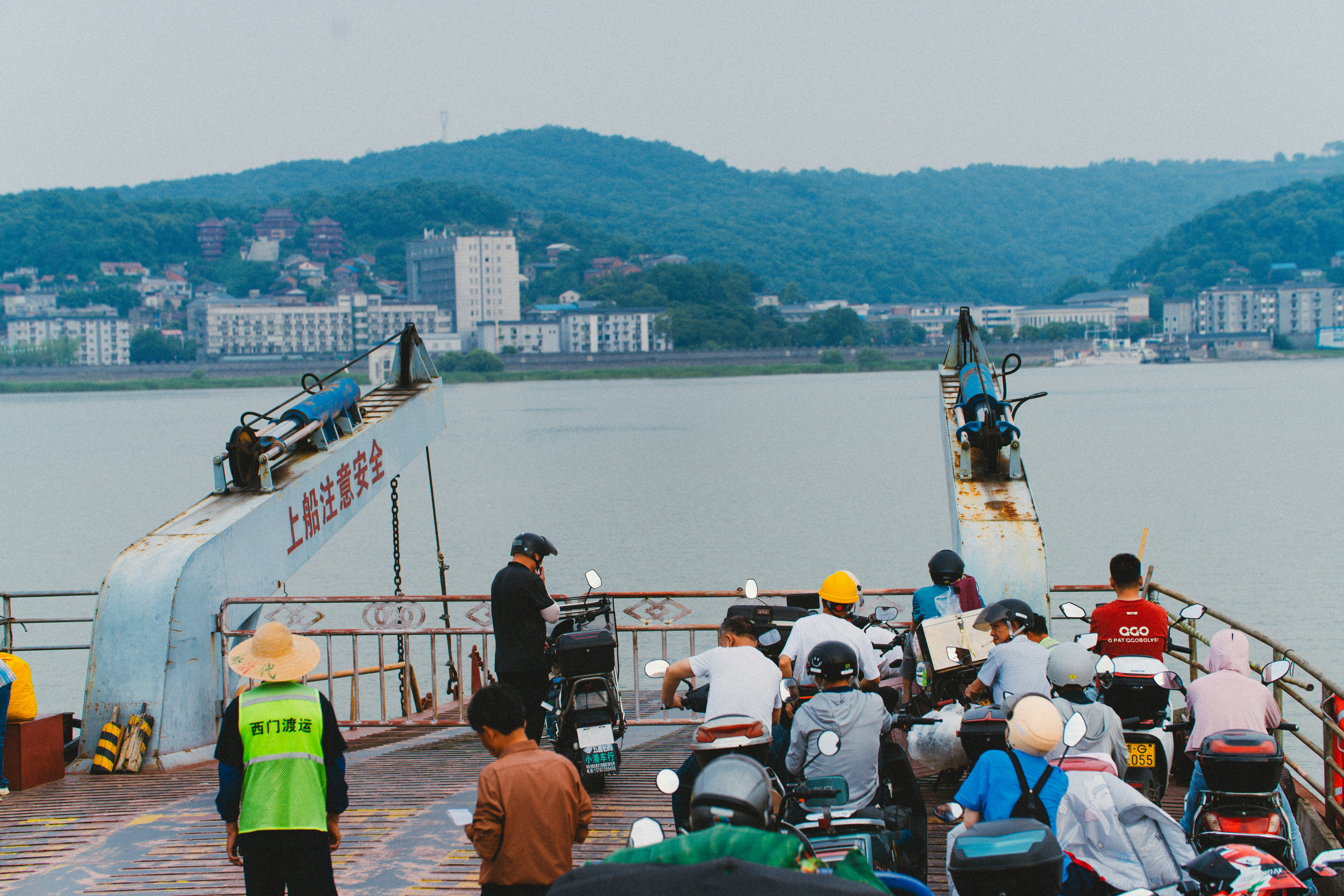 Passengers Lined Up for Departure on a Busy River Ferry