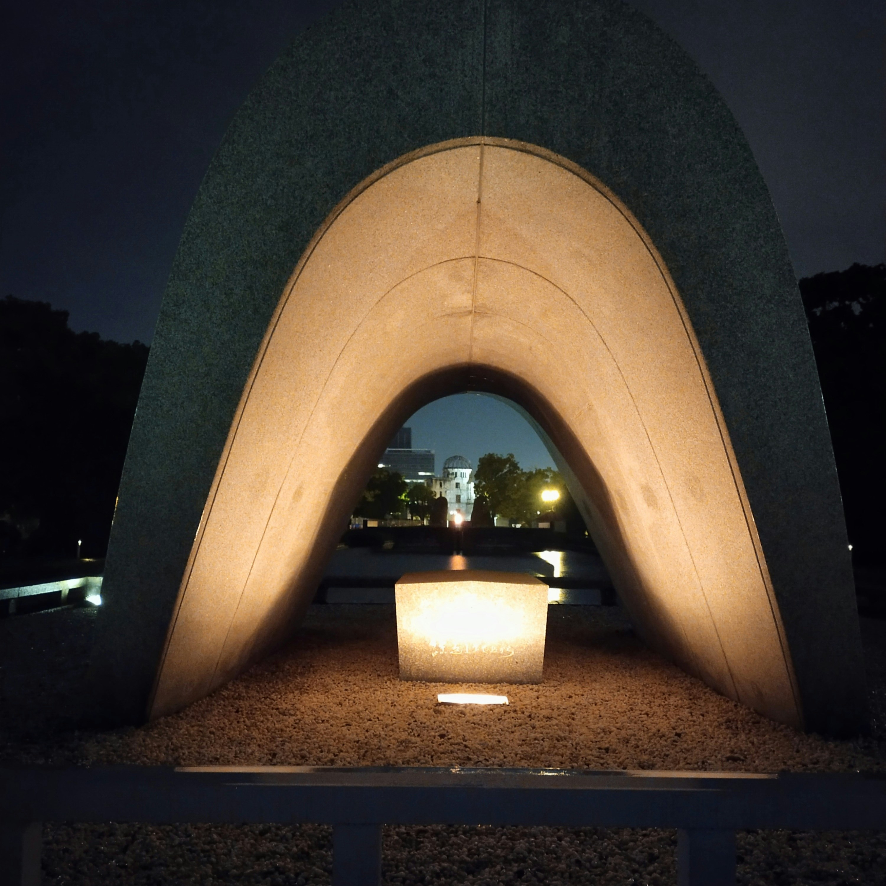 Arc of Light: Night Monument Framing a Glowing Pedestal