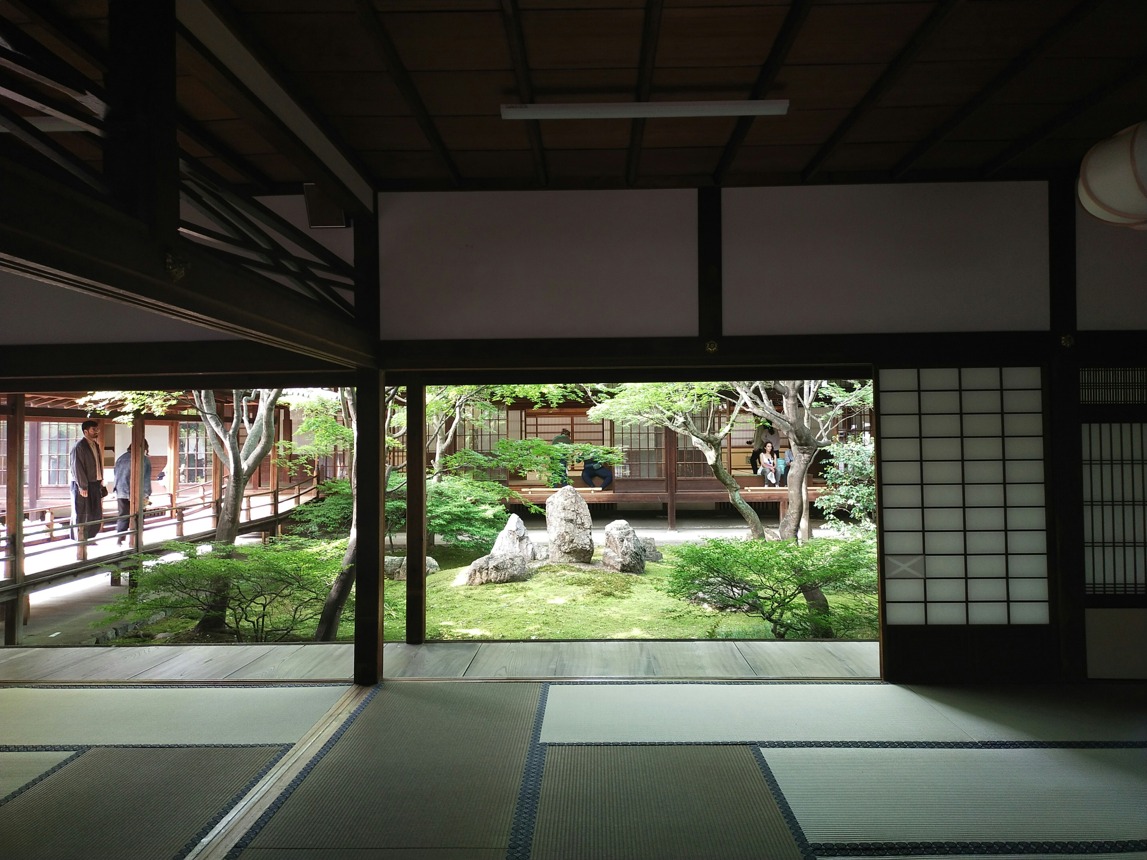 Traditional japanese room overlooking a serene garden.