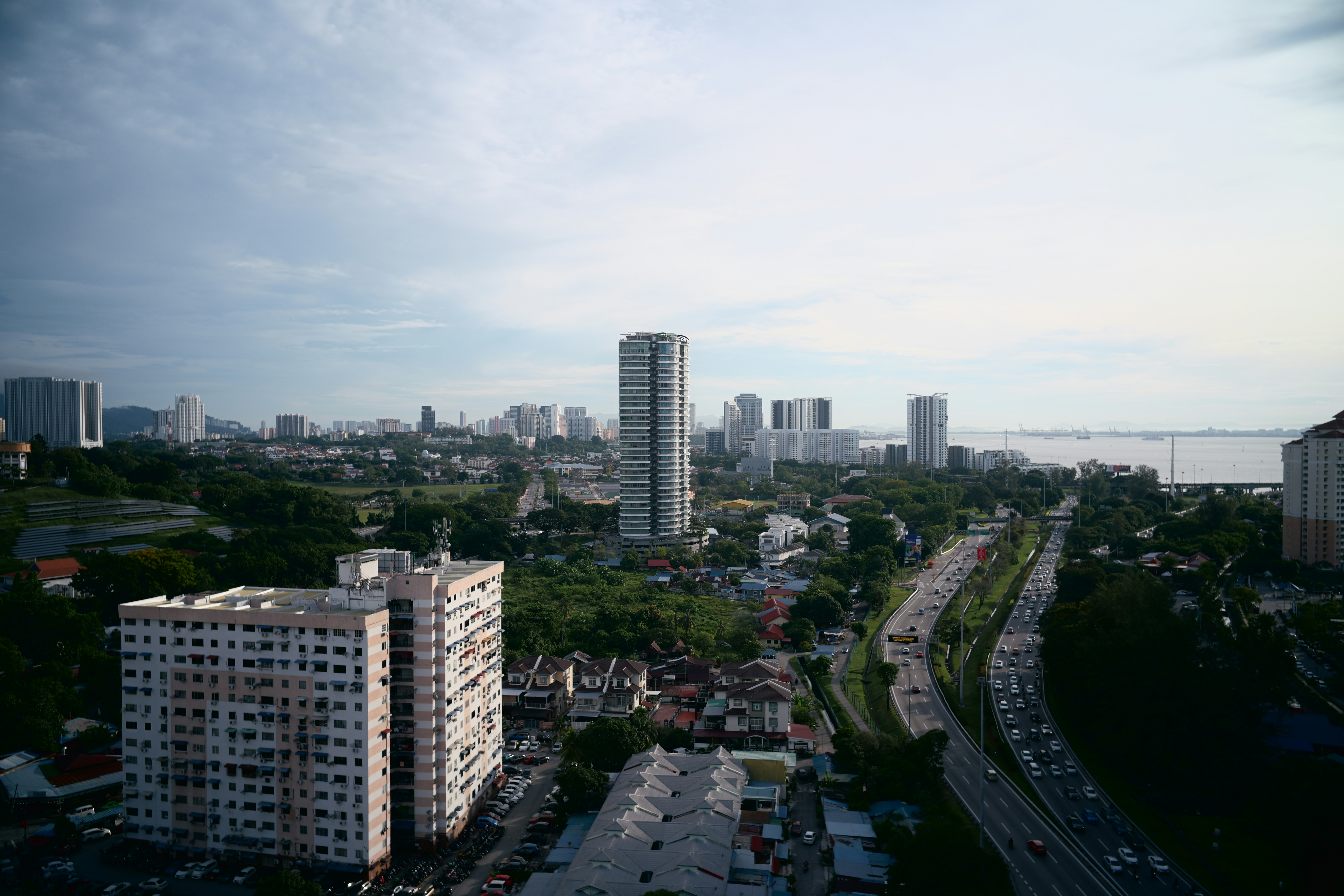 Midday Skyline over a Coastal Corridor