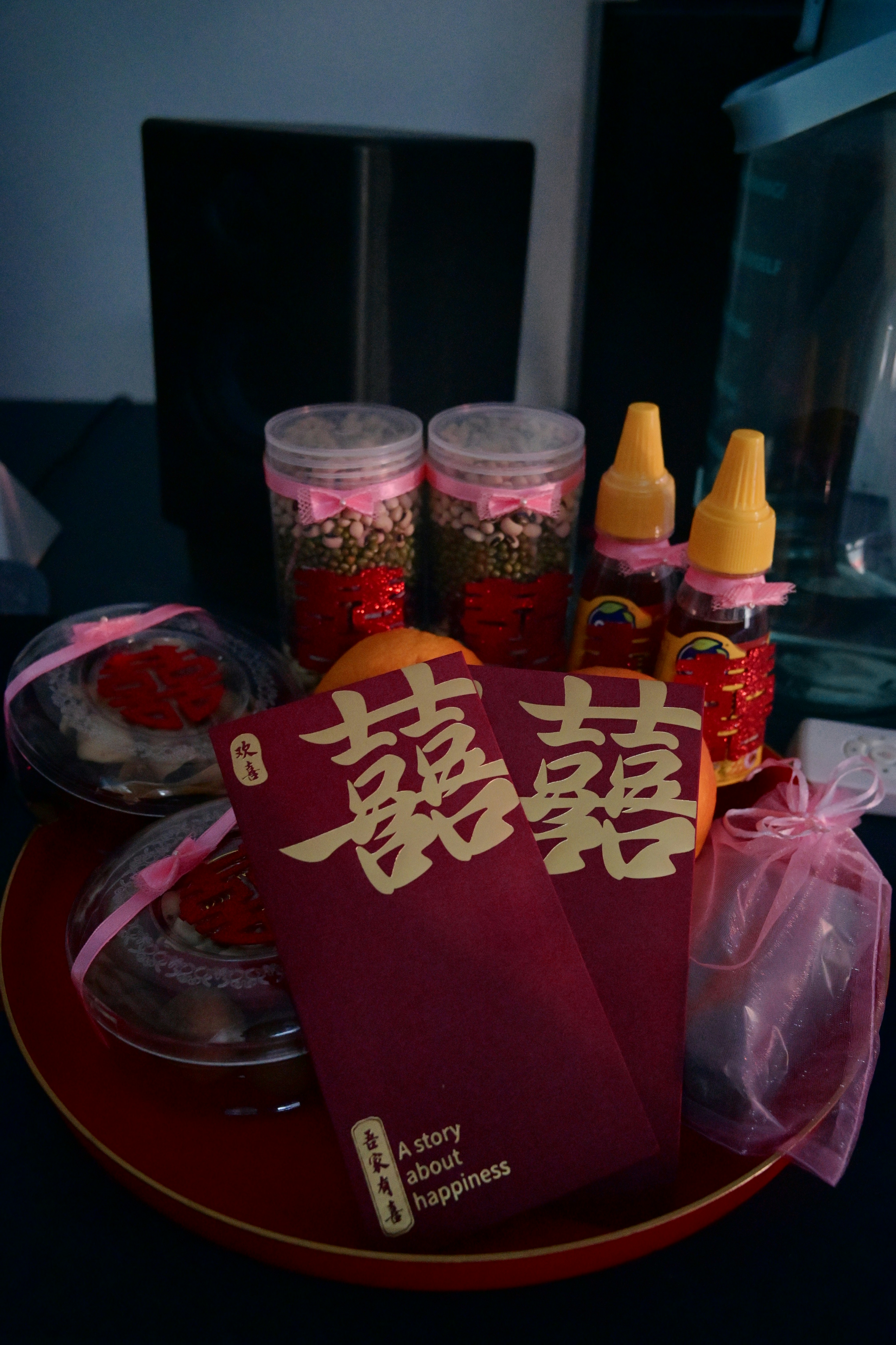 Red envelopes and party condiments: a festive still-life centerpiece