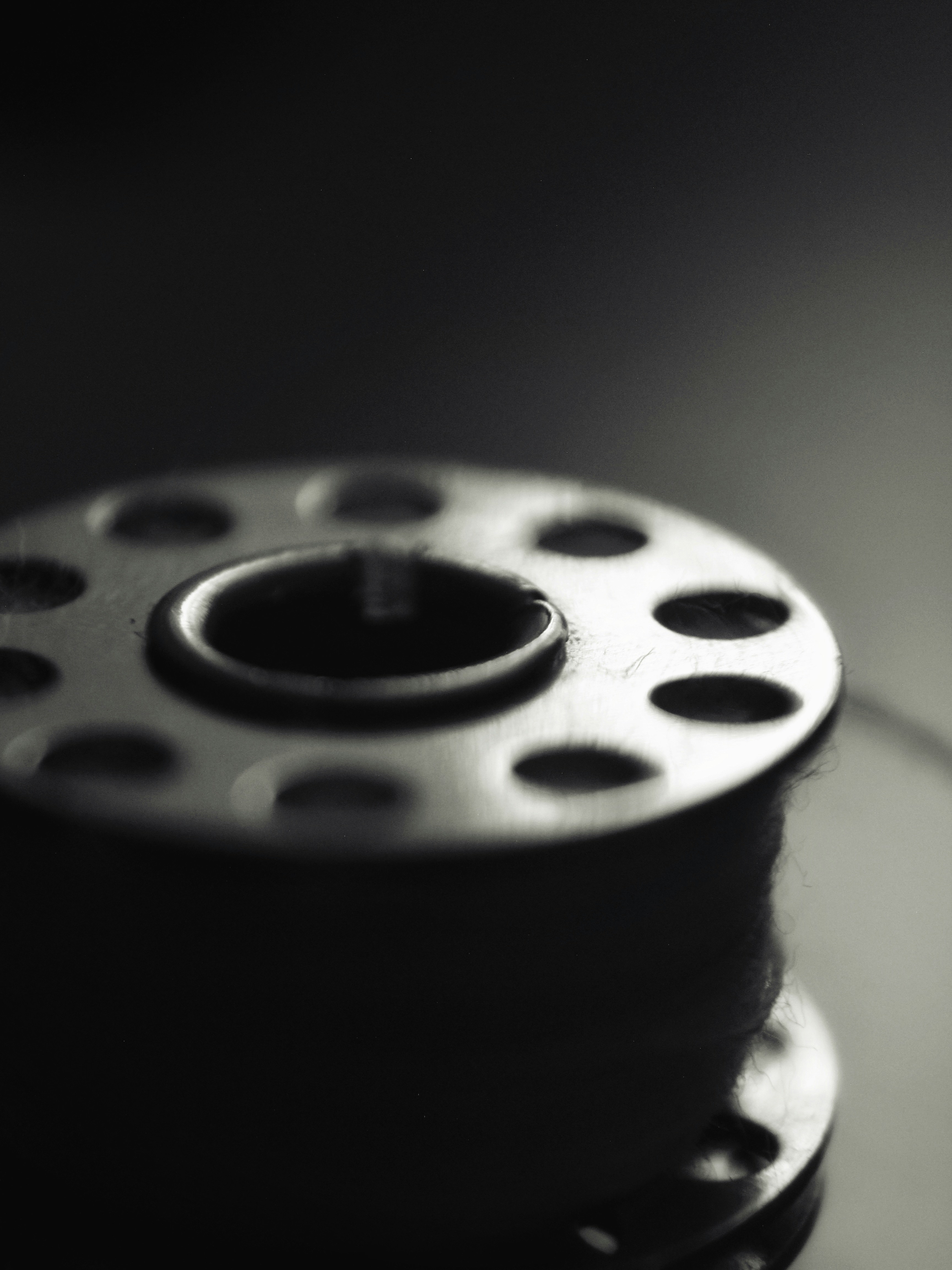 Macro Portrait of a Metallic Spool Under Low Light