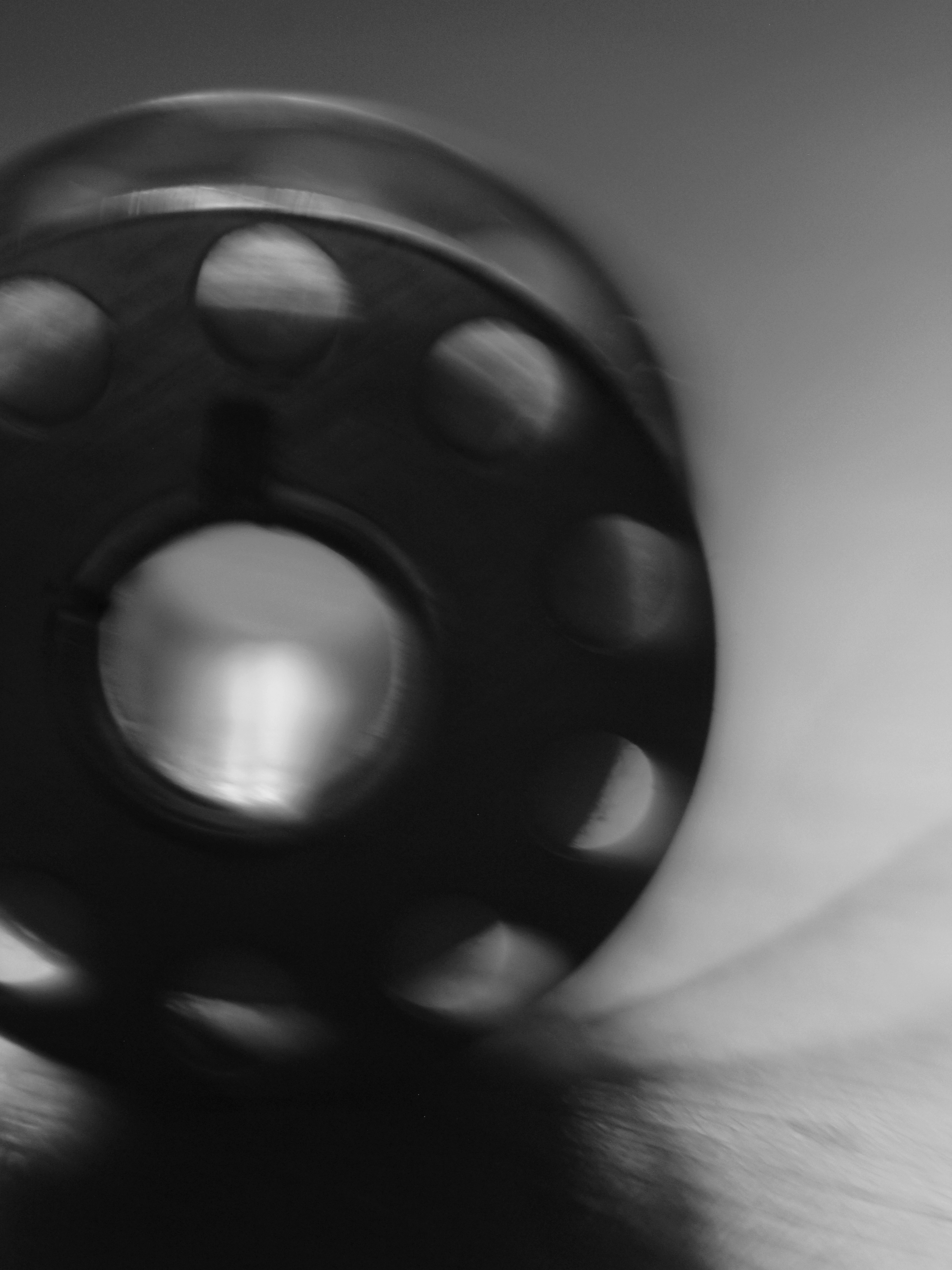 Close-up of a mechanical lens aperture in motion