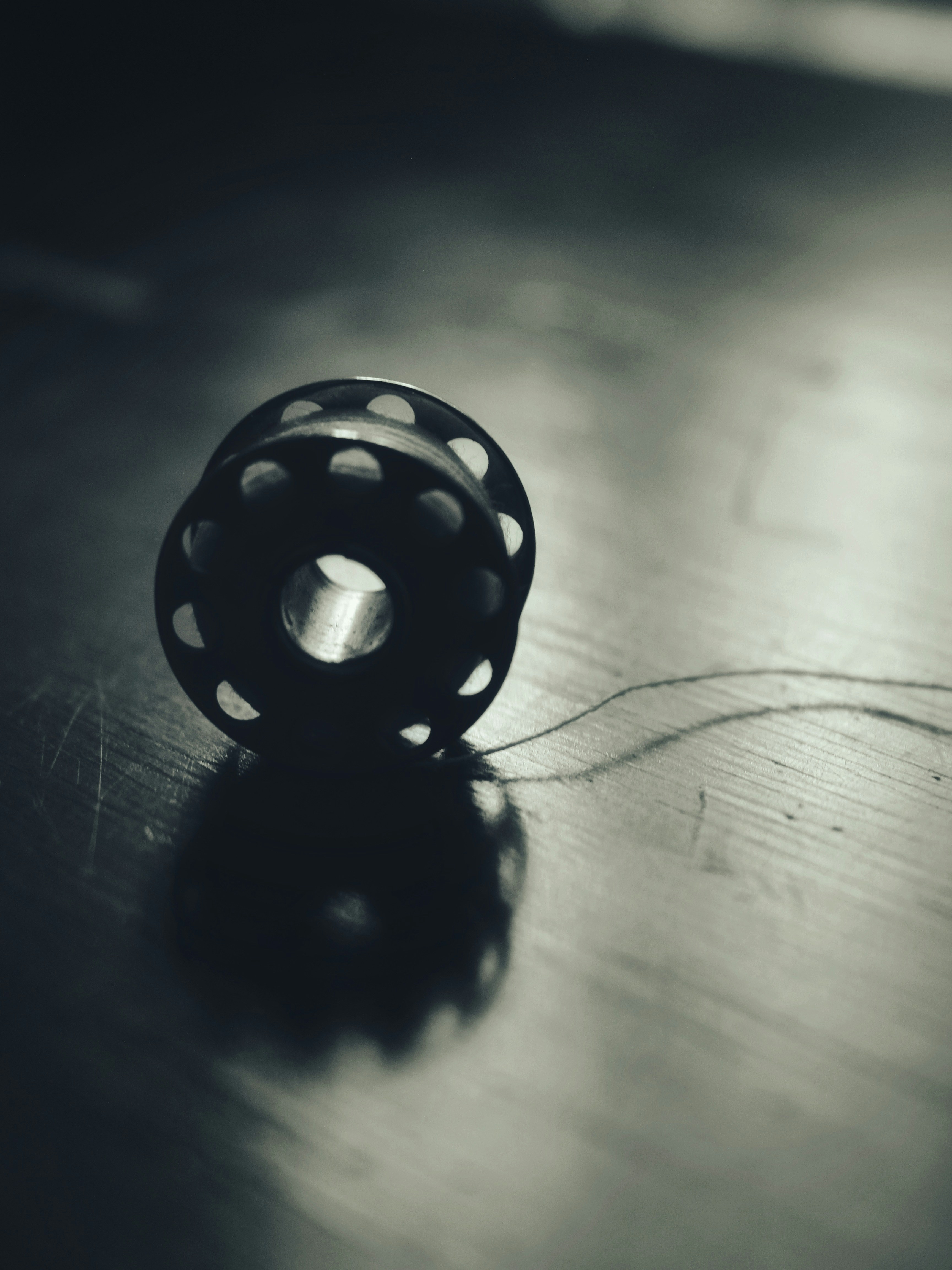 Dots of Light: A Tiny Orbit on a Quiet Metal Stage