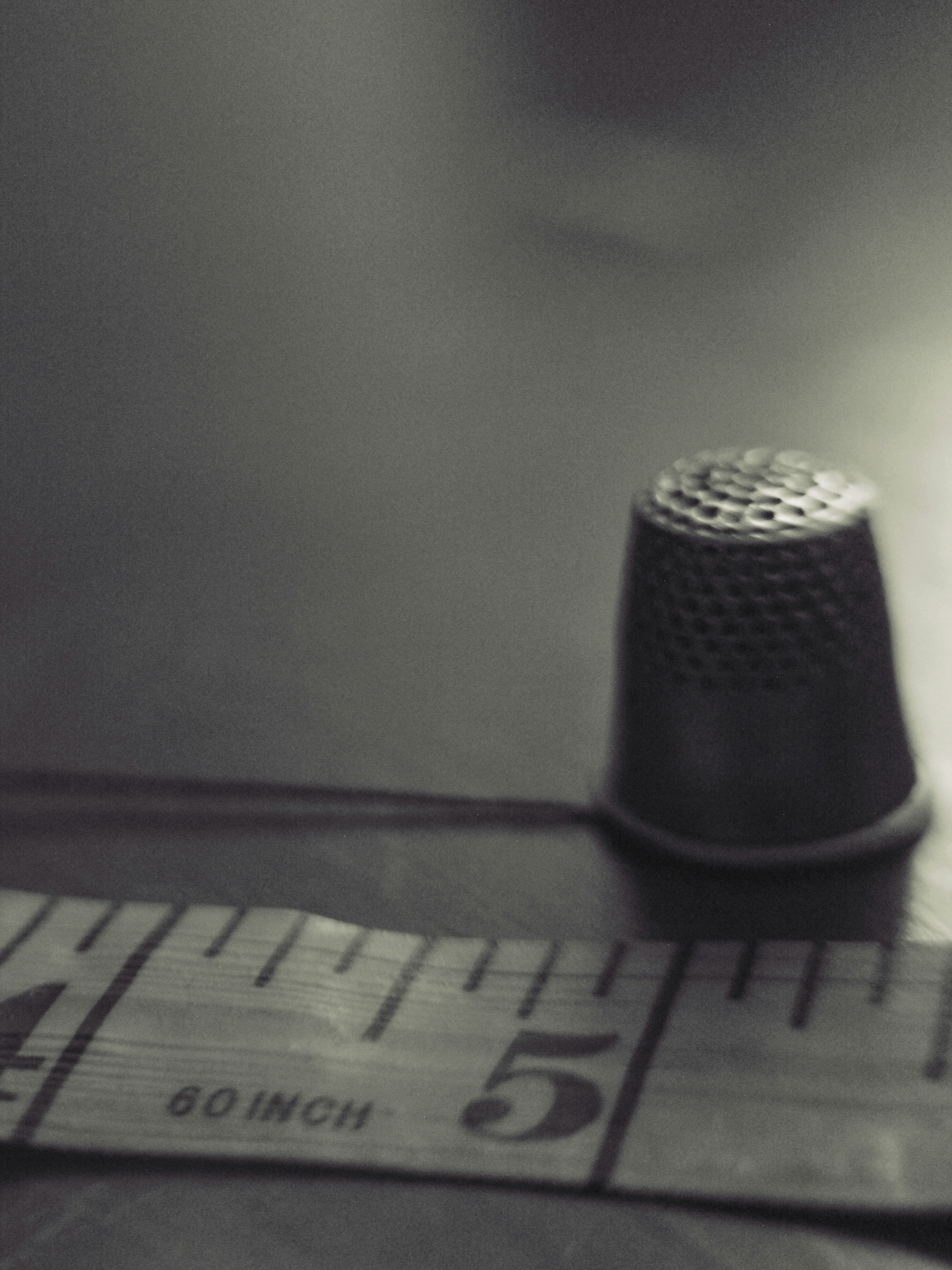 Macro Microphone Grip: A Close-Up of the Beaded Top and Measuring Tape