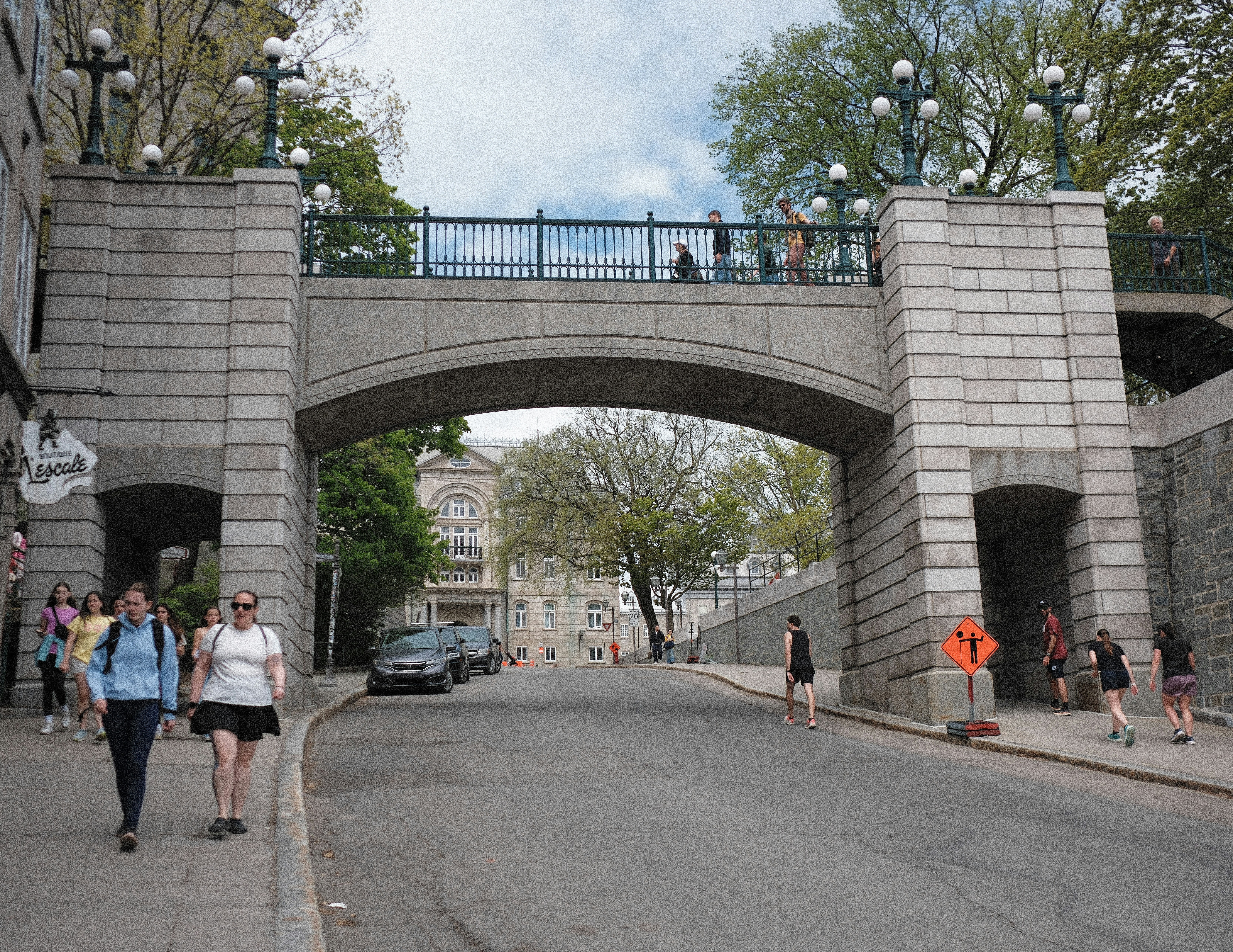 Pedestrian Bridge Overlooking a City Street