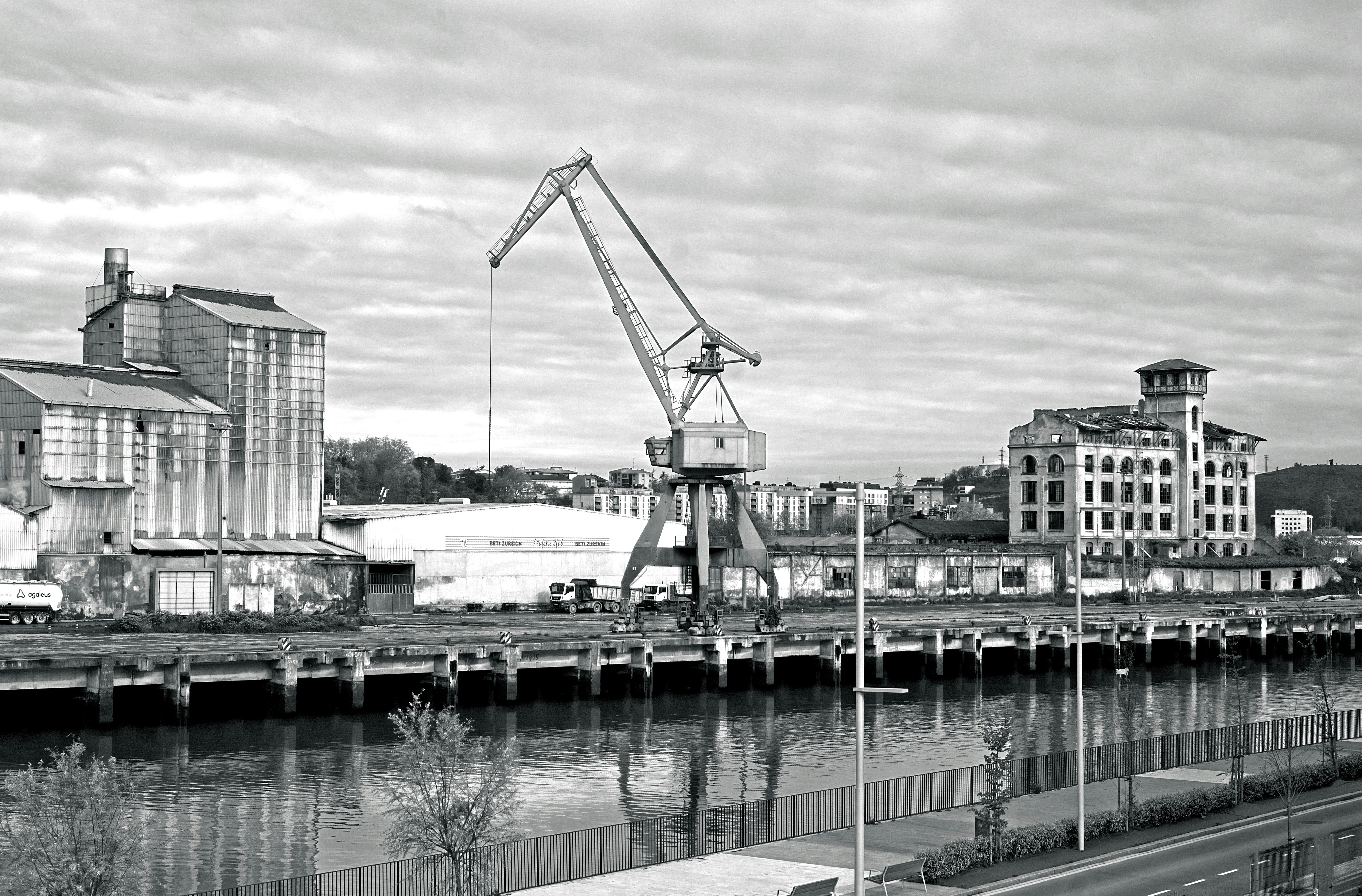 Harbor Crane at Dusk: Echoes of Industry Along the Waterfront