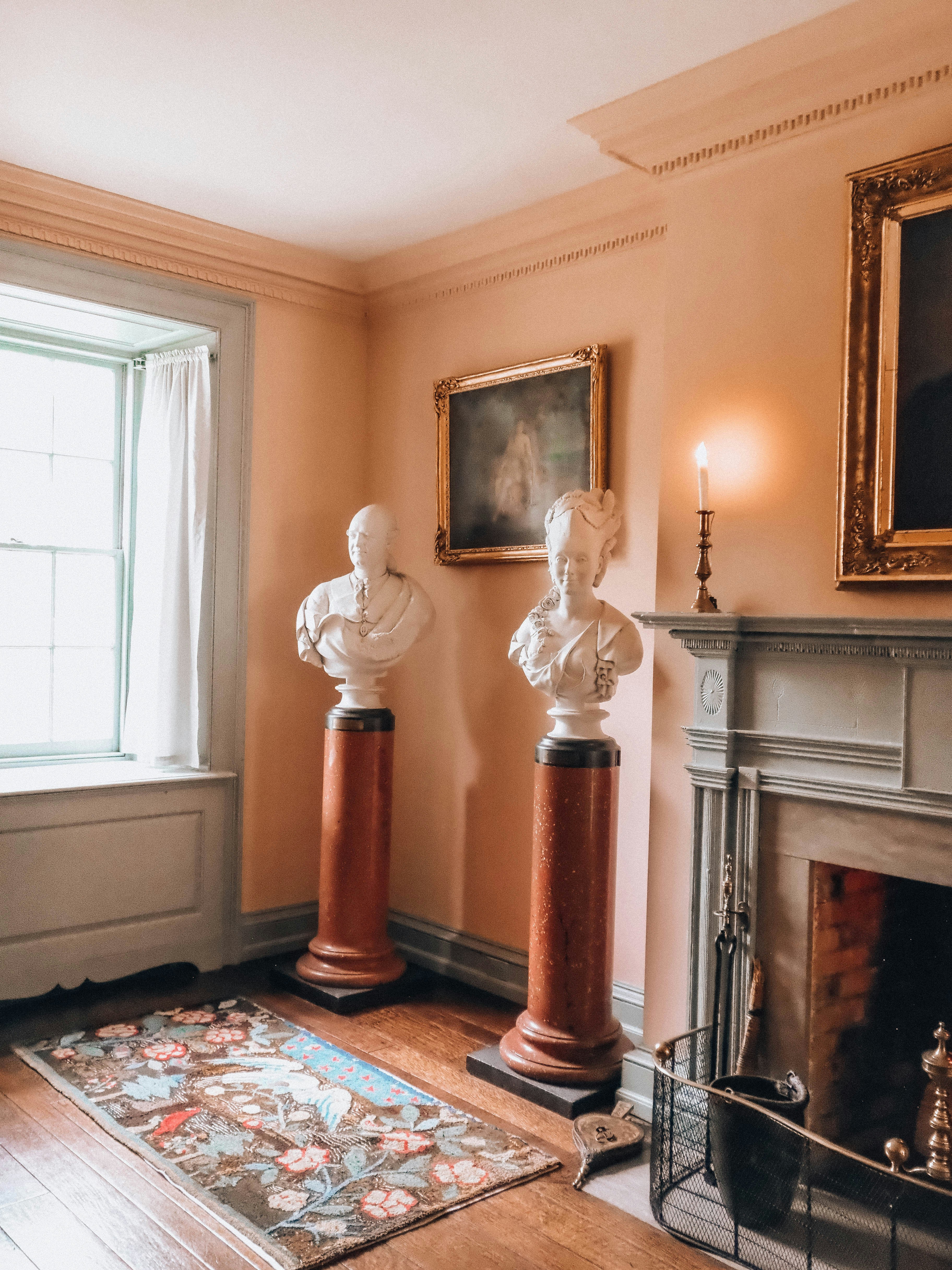 Busts and Hearthlight: An Elegant Corner of a Sunlit Parlor