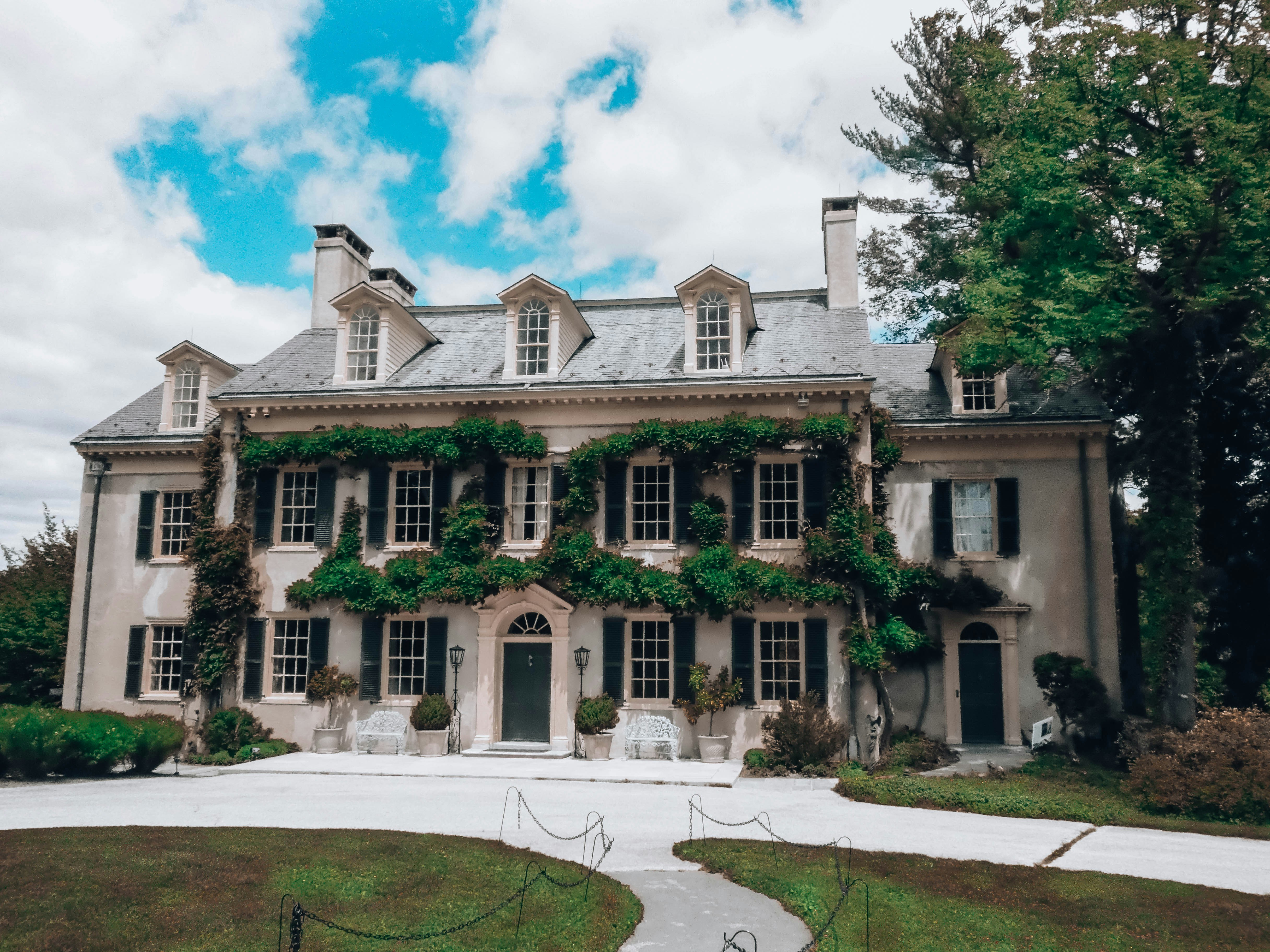  ivy-clad manor in a sunlit meadow